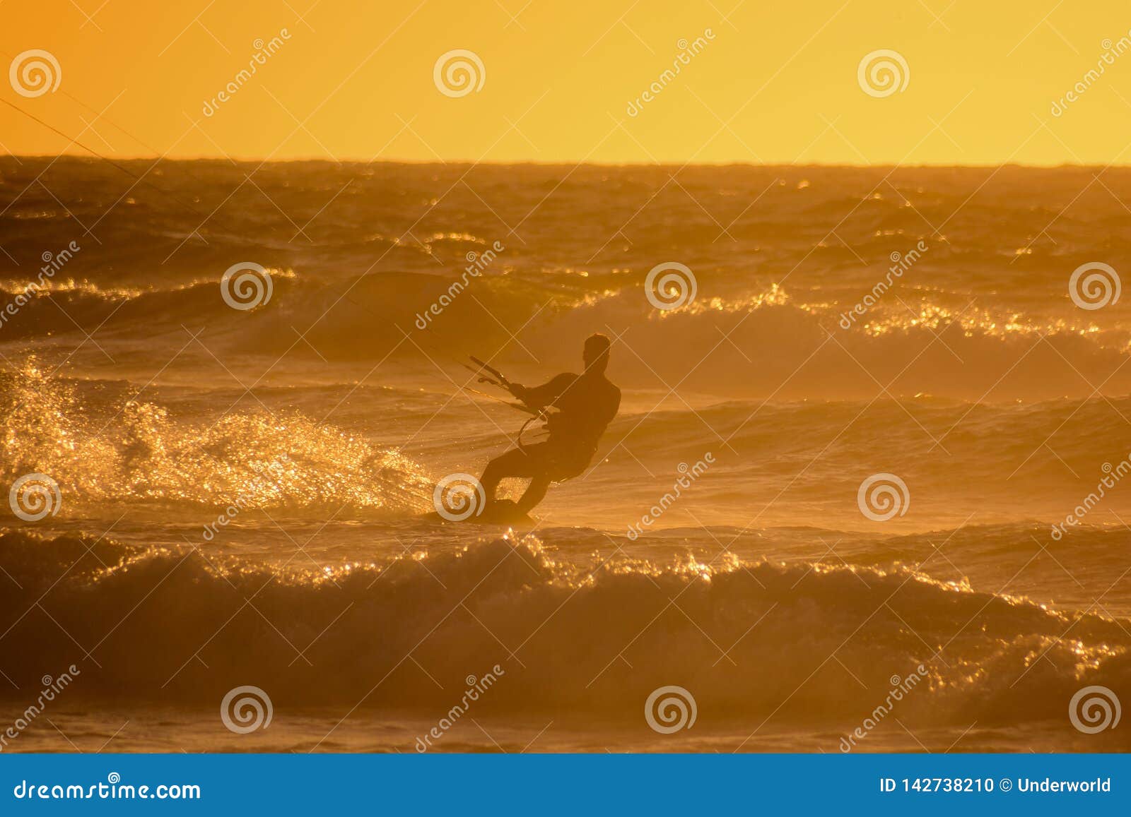Surfer at Sunset on a Calm Ocean Stock Photo - Image of coast, calm ...