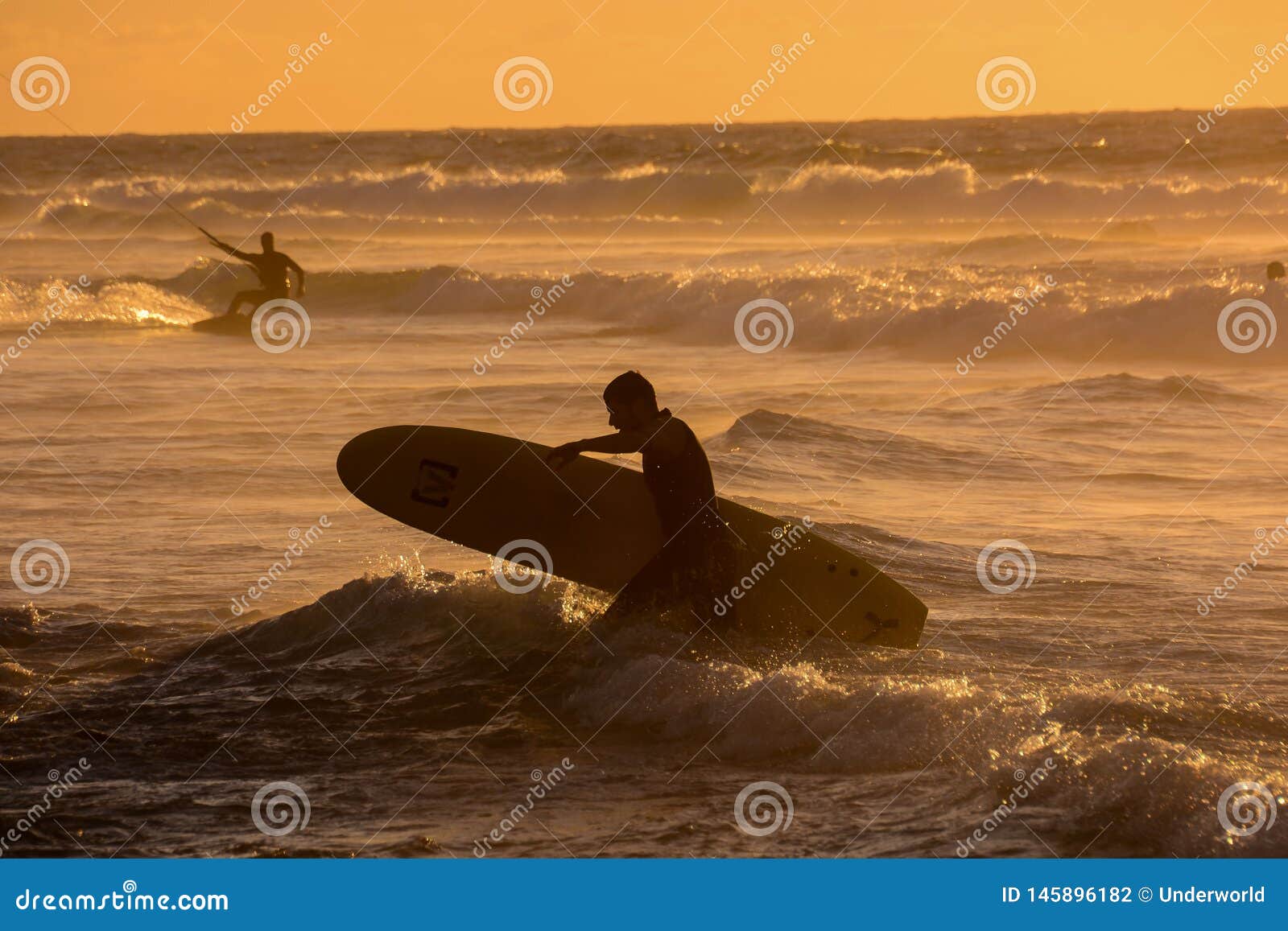 Surfer at Sunset on a Calm Ocean Editorial Photography - Image of ...