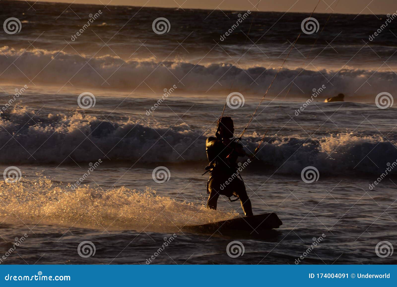 Surfer at Sunset on a Calm Ocean Stock Image - Image of sunlight ...