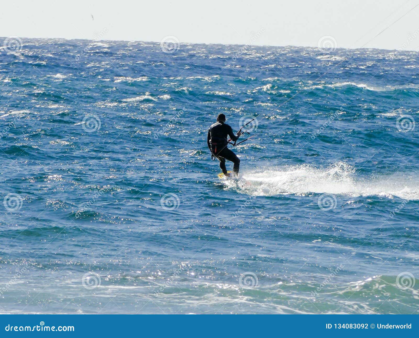 Surfer at Sunset on a Calm Ocean Stock Photo - Image of outdoor ...