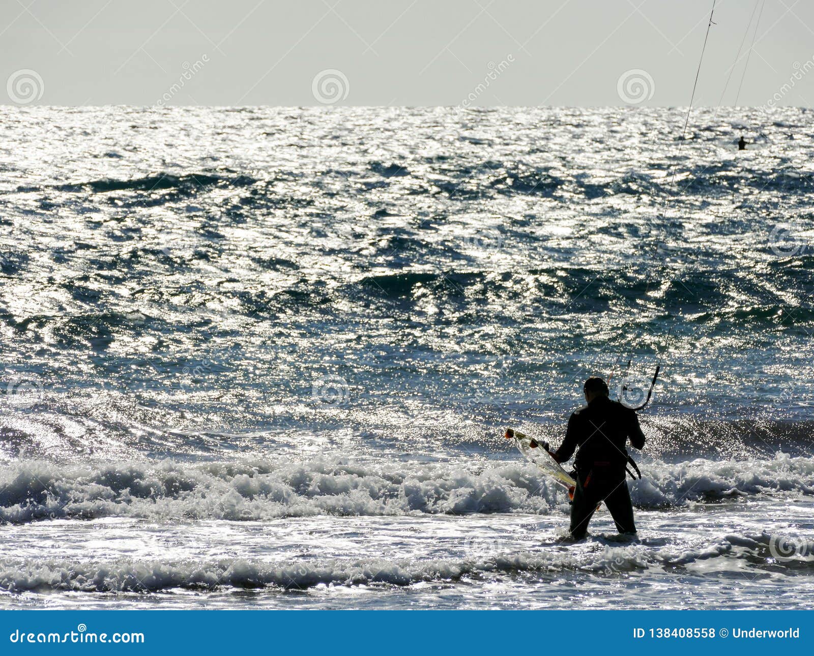 Surfer at Sunset on a Calm Ocean Stock Photo - Image of nature, ocean ...