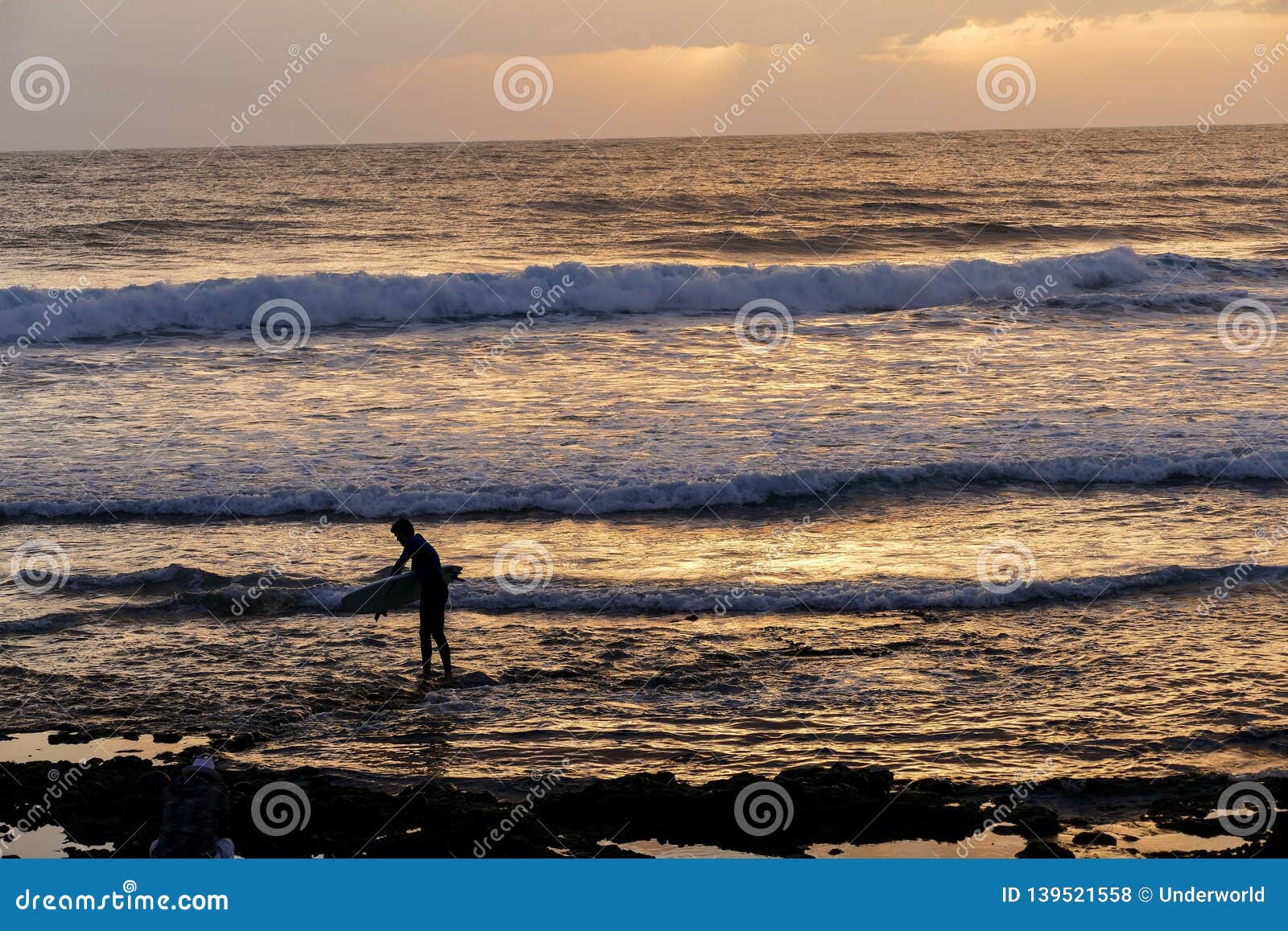 Surfer at Sunset on a Calm Ocean Stock Photo - Image of sunrise ...