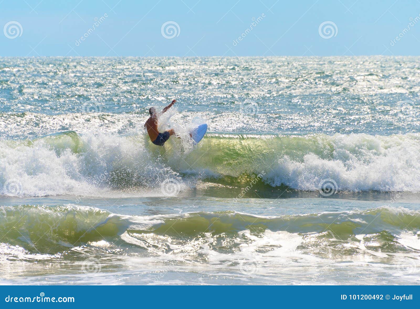 Surfer surf a wave editorial photography. Image of daytime - 101200492