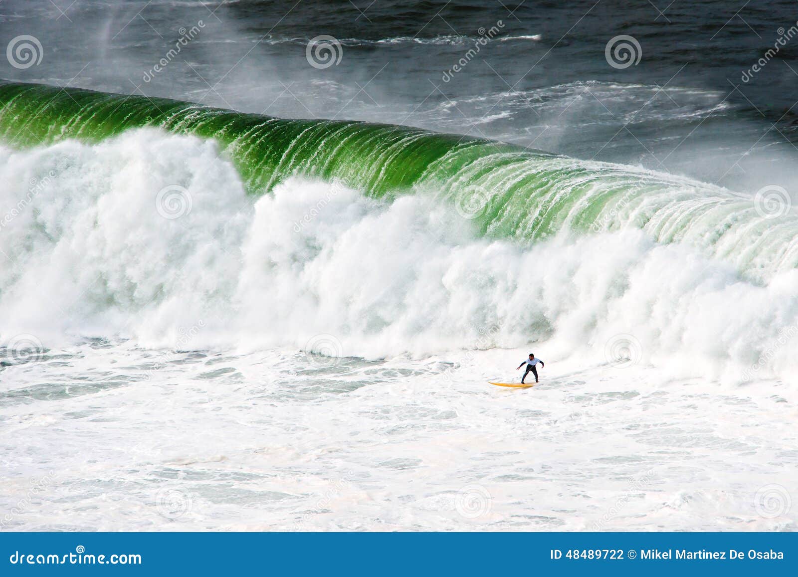 Surfer under big wave stock photo. Image of crashing - 48489722