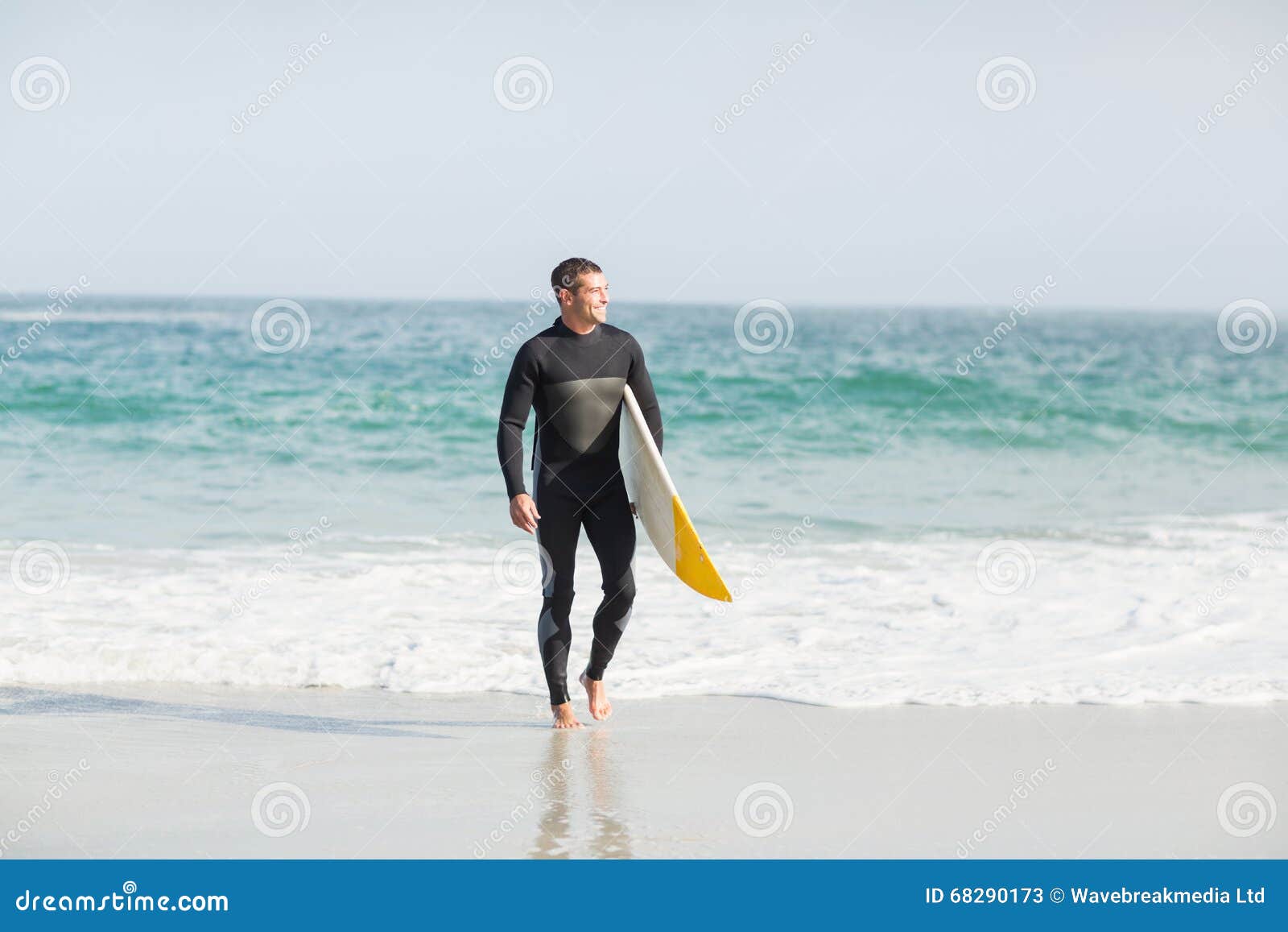 Surfer Walking on the Beach with a Surfboard Stock Image - Image of ...