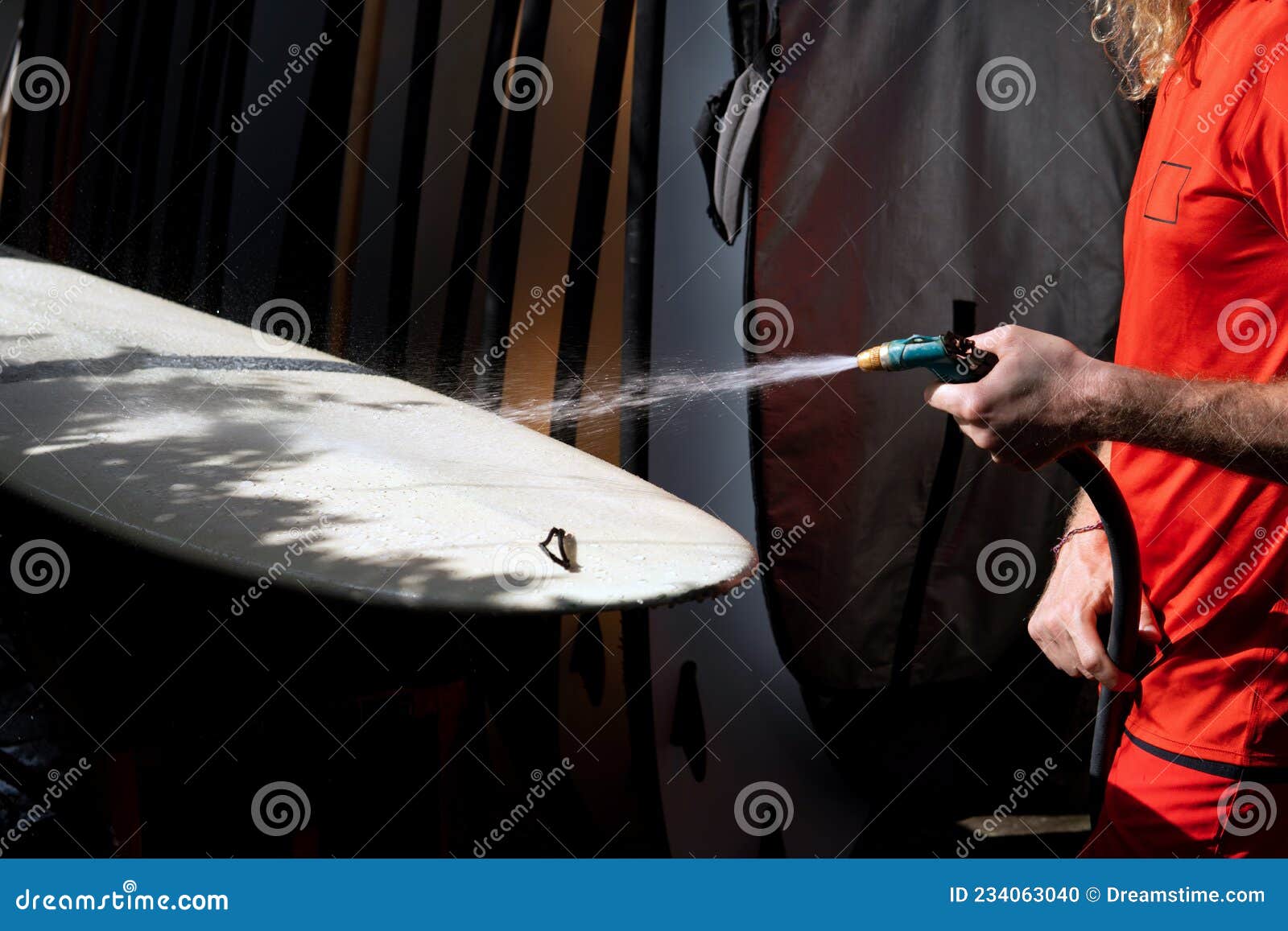 Surfer Washes White Surfboard with Water Stock Photo - Image of washing ...