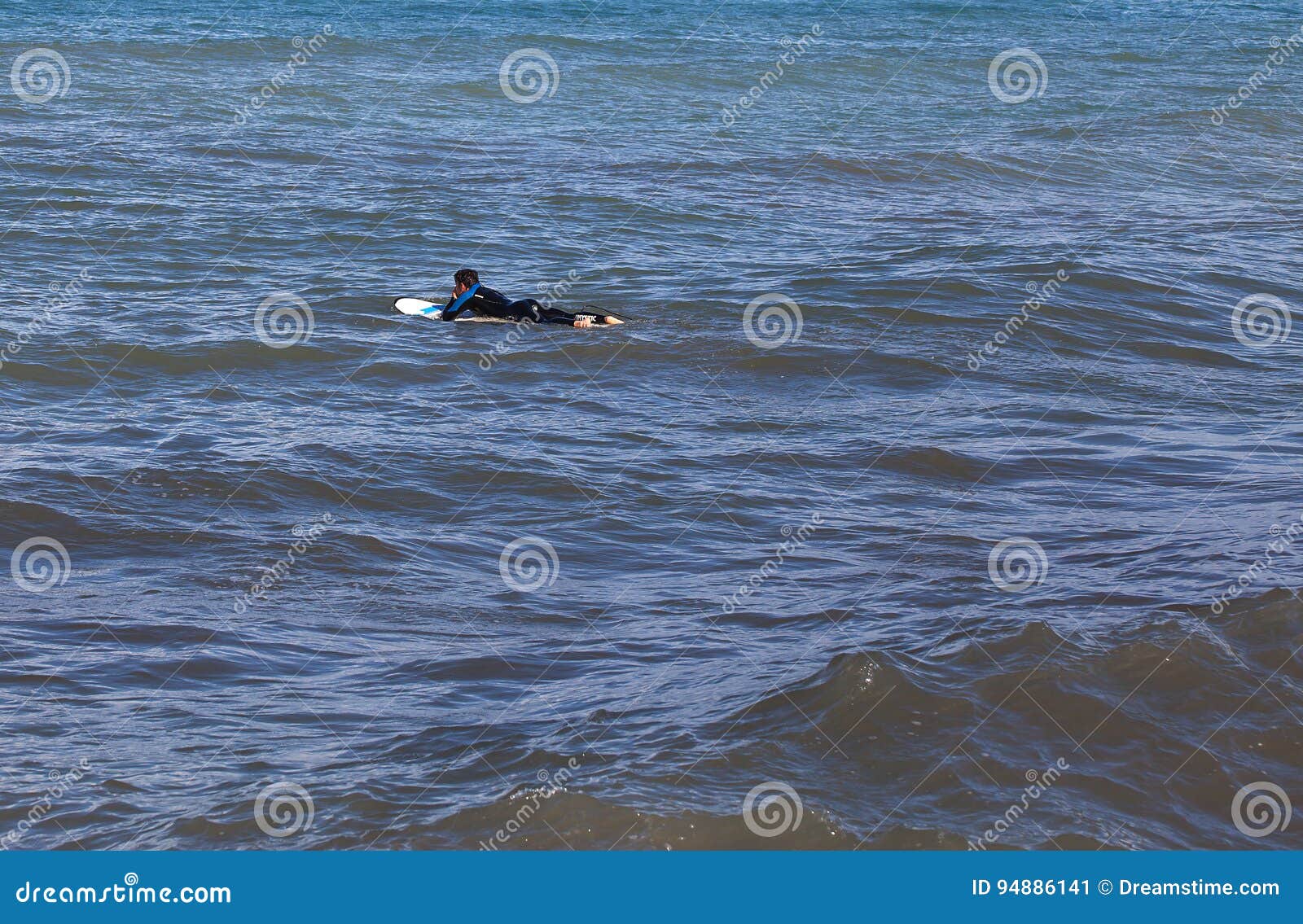 Surfer in the Water Waiting for the Wave. Stock Image - Image of travel ...