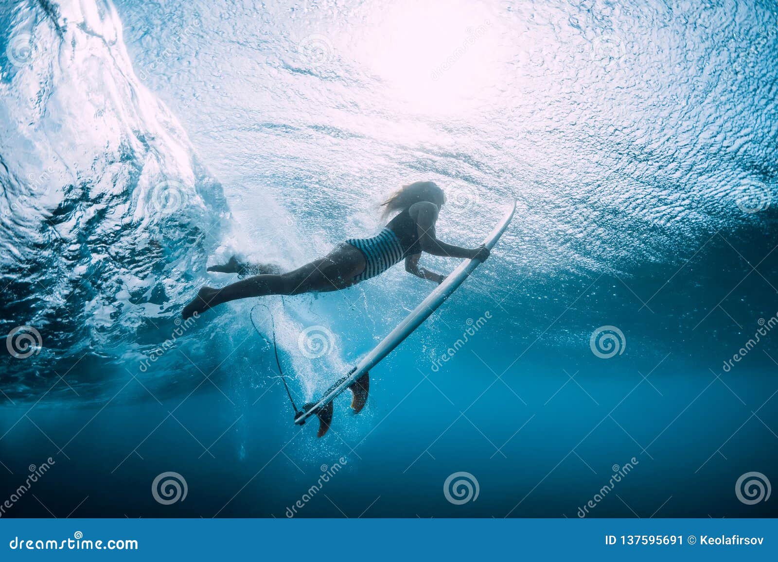 Surfer Woman Dive Underwater with Under Blue Wave Stock Image - Image ...