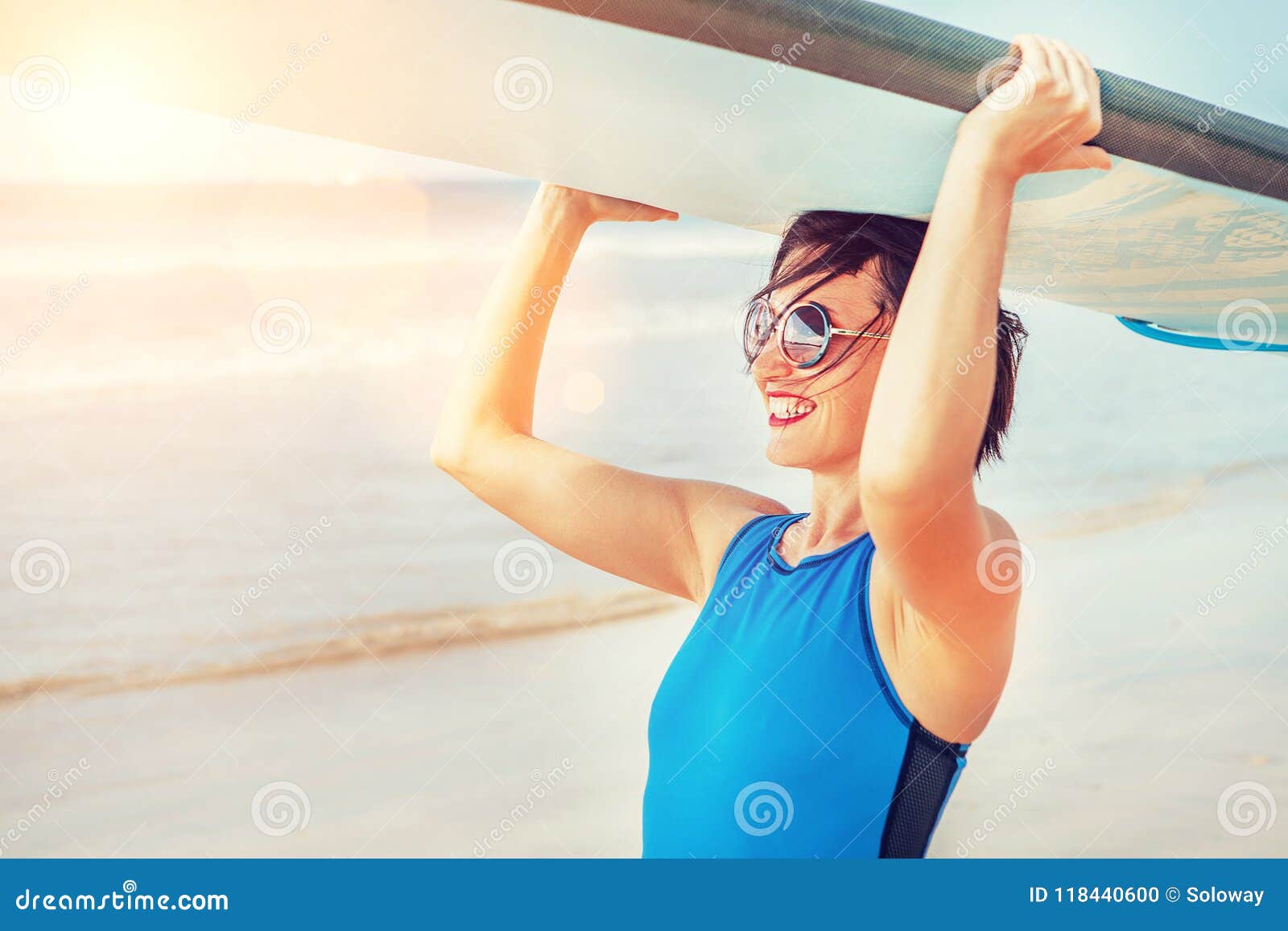 Surfer Woman with Longboard Stock Photo - Image of sunset, people ...