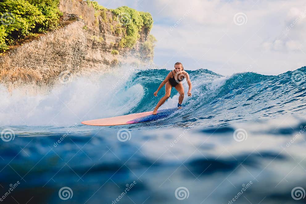 Surfer Woman At Surfboard Ride On Ocean Wave Woman In Ocean During