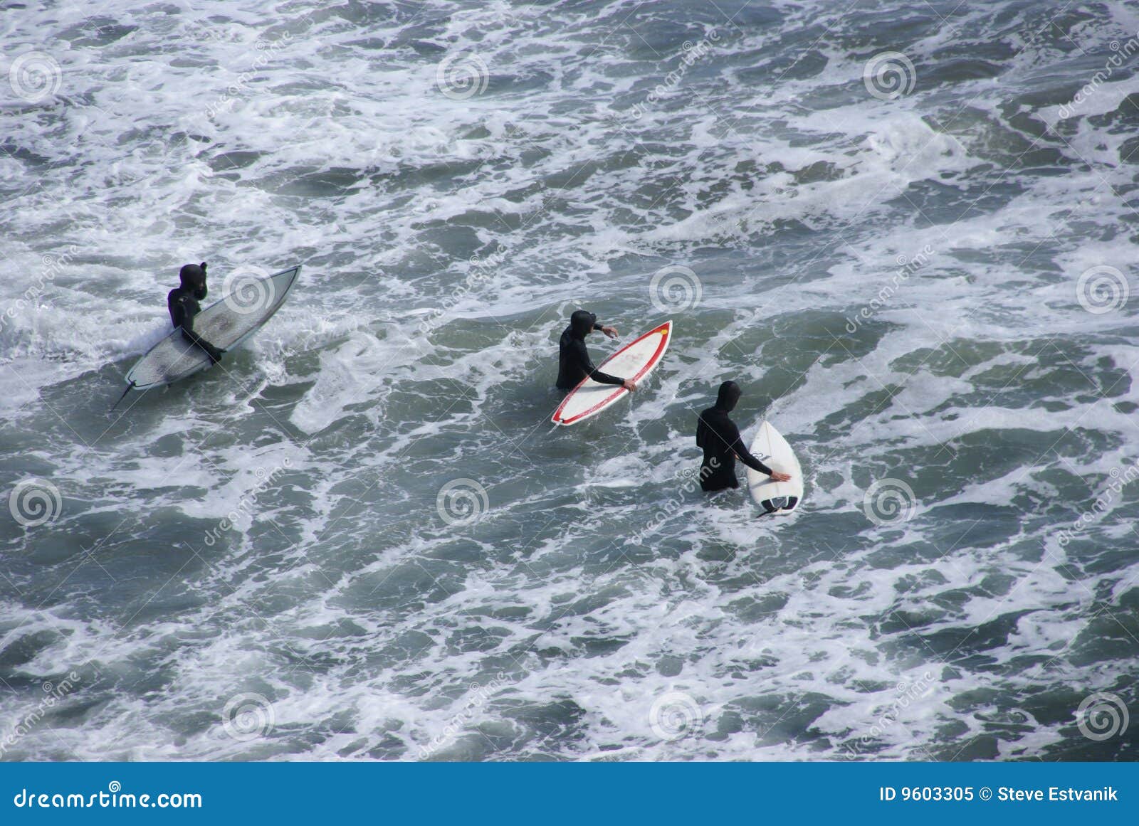Surfers Paddling Out To Catch a Wave Stock Image - Image of coast ...