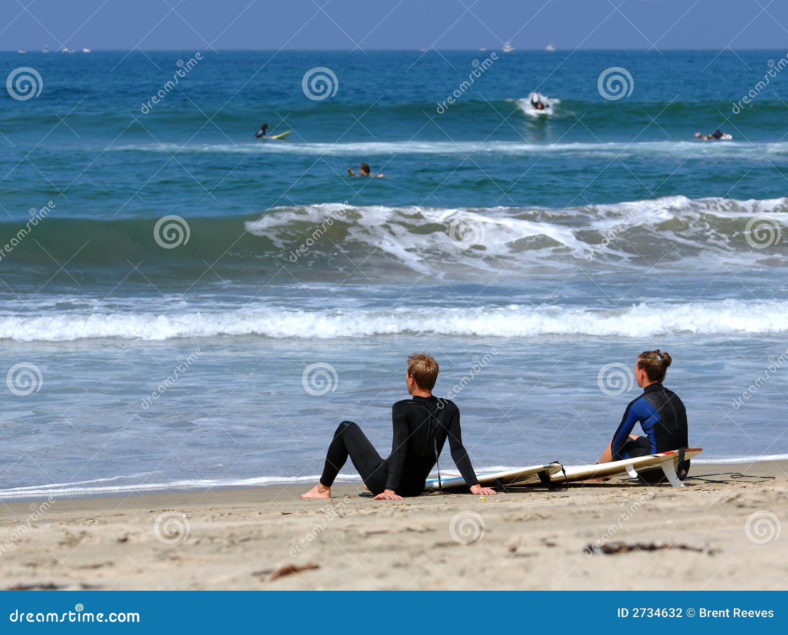 Surfers Take a Rest stock photo. Image of coast, water - 2734632