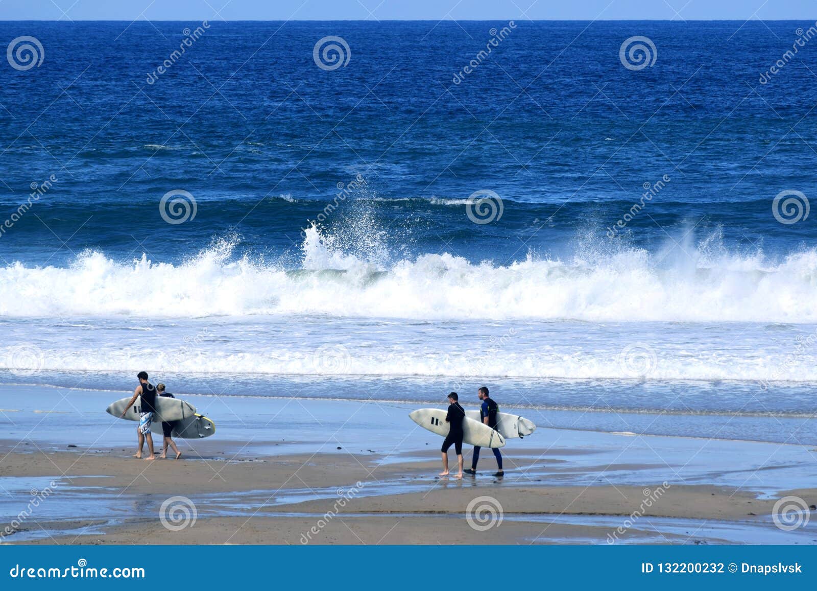 Surfing on the beach editorial photography. Image of light - 132200232