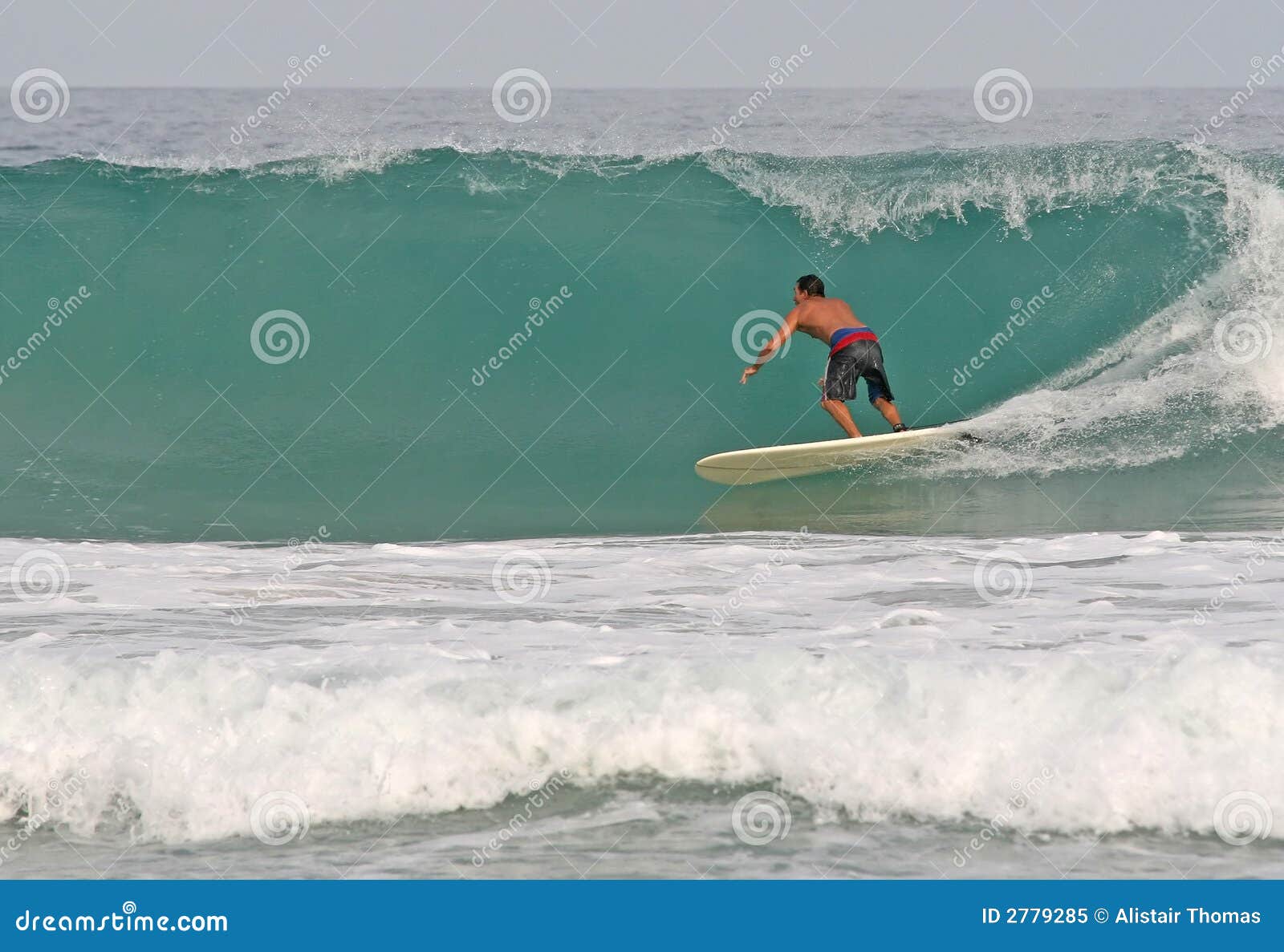 Surfing Hollow Waves stock image. Image of surfboard, green - 2779285