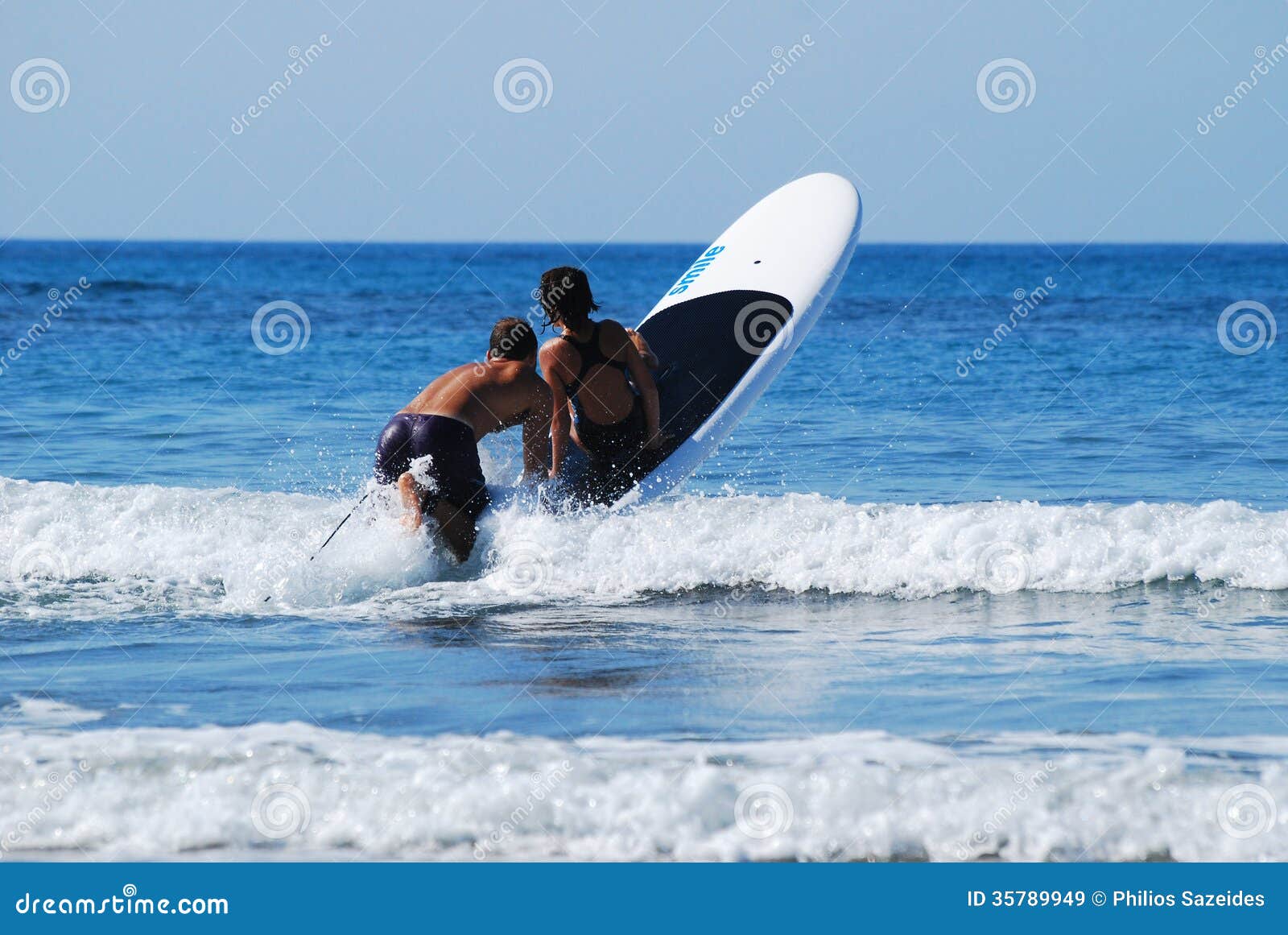 Family surfing stock image. Image of wave, surf, family - 35789949