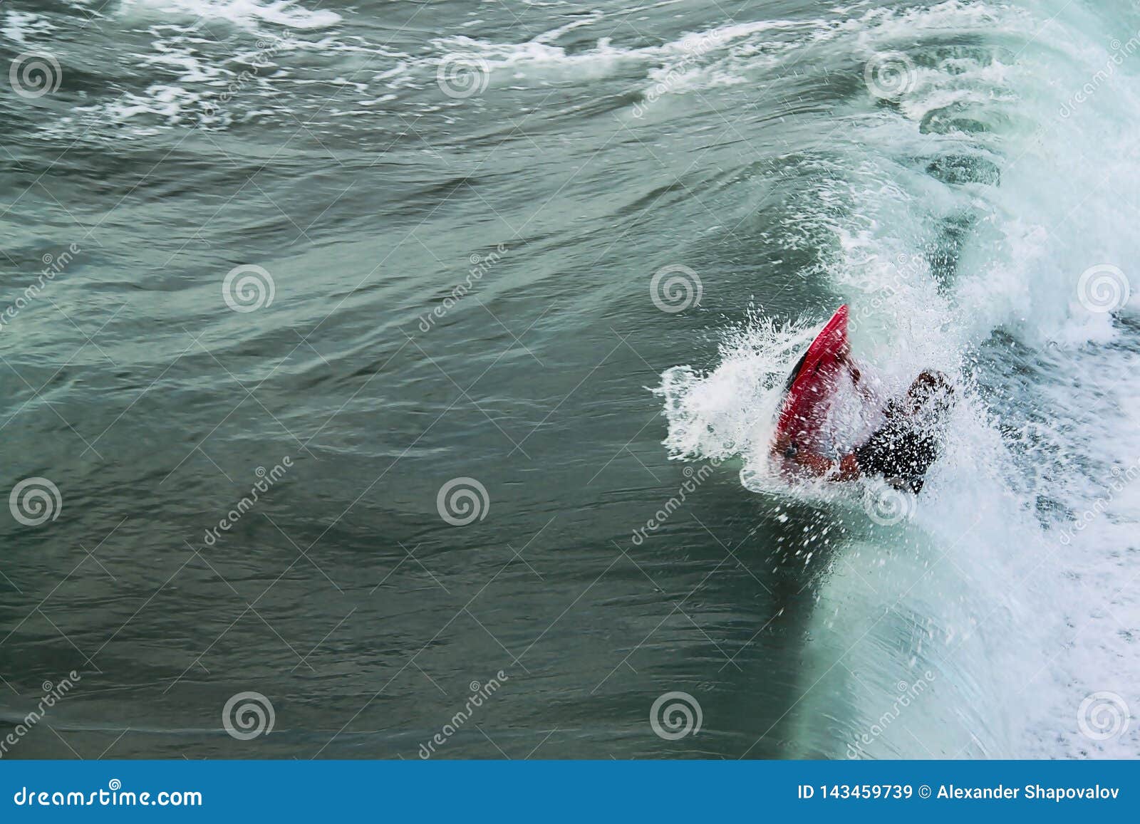 Surfing Riding Waves An Anidentified Surfer Catches A Wave Stock