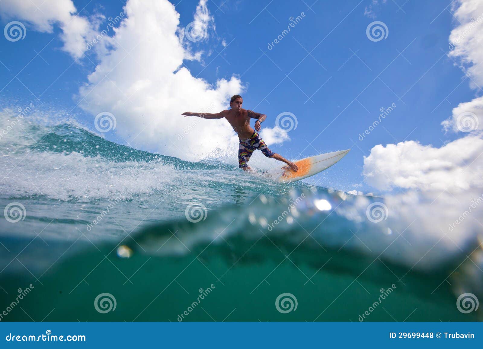 Surfing a wave stock photo. Image of surfboard, surfer - 29699448