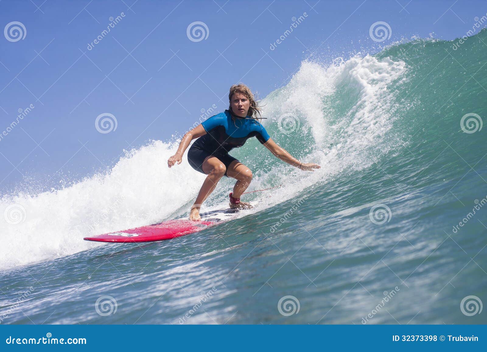 Surfing a wave stock photo. Image of surf, girl, water - 32373398