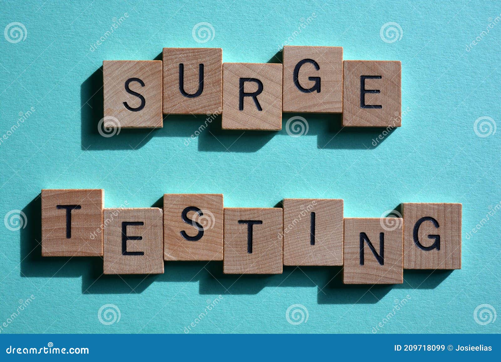 Surge Testing, Word in 3D Wooden Alphabet Letters Isolated on Blue ...