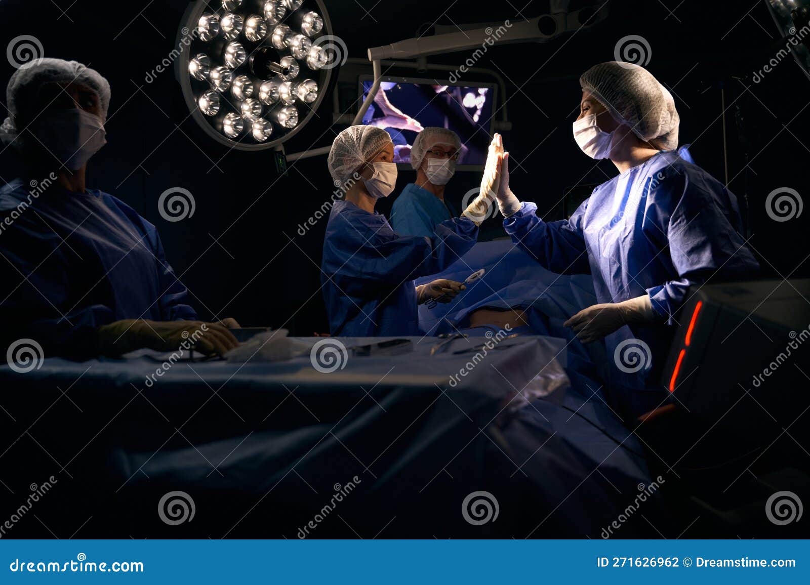 Surgeon and the Assistant Give High Five after Successful Operation ...