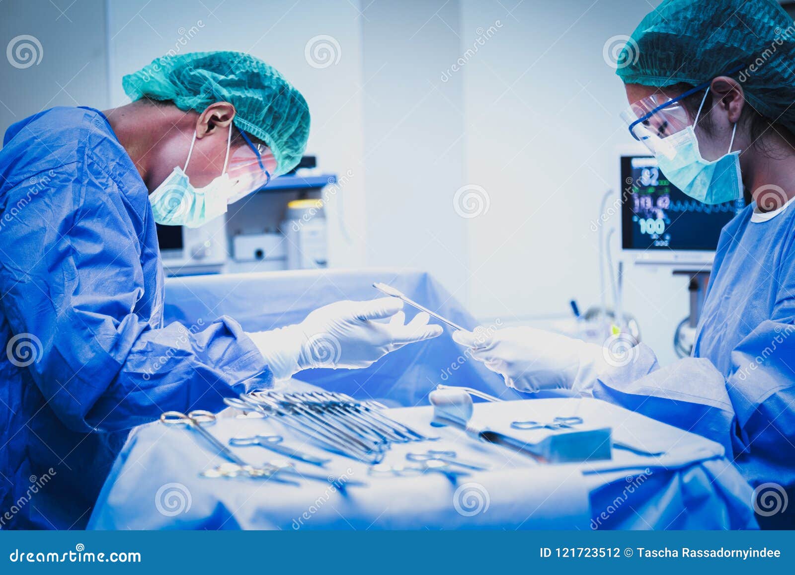 The Surgeon and Assistant are Operating in the Operating Room. Stock ...