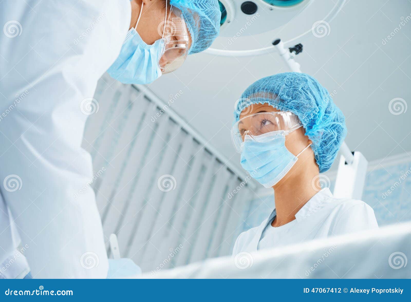Surgeon and Assistant in Operating Room Stock Photo - Image of people ...