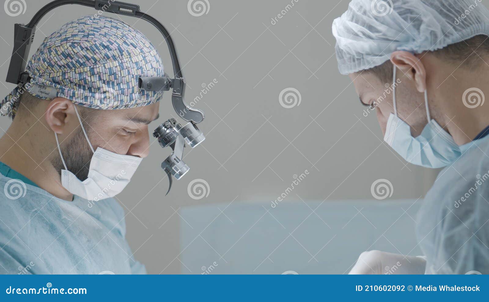 Surgeon and Assistant Perform Operation. Action. Two Qualified Surgeons ...