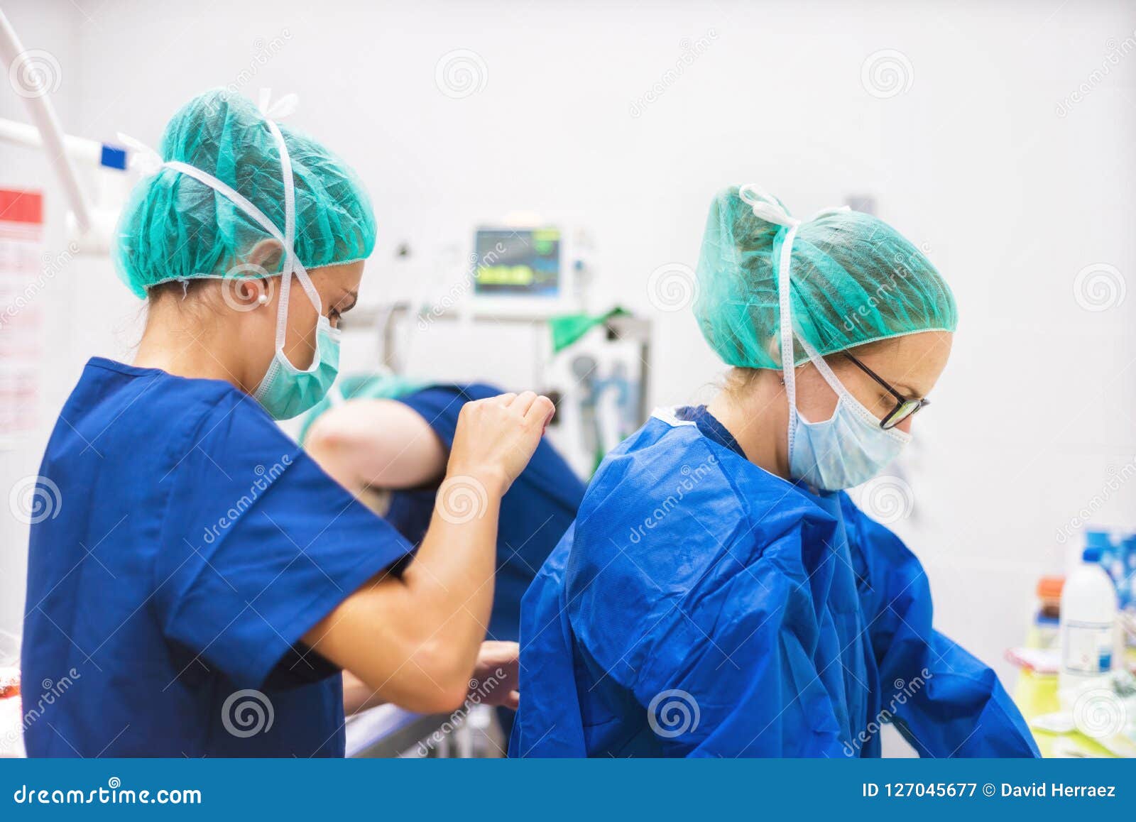 Surgeon and Assistant Preparing for Surgery Stock Image - Image of ...