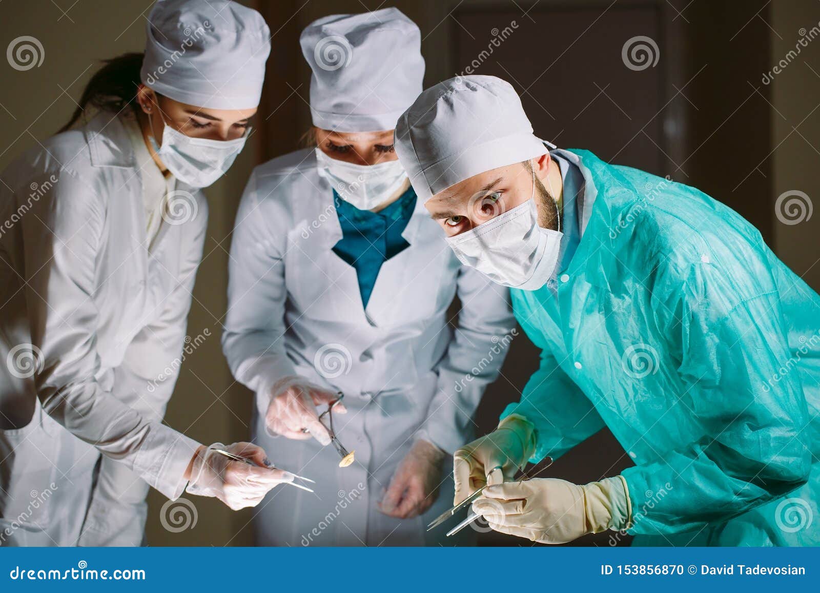 The Surgeon and His Assistants Makes an Operation. Stock Photo - Image ...