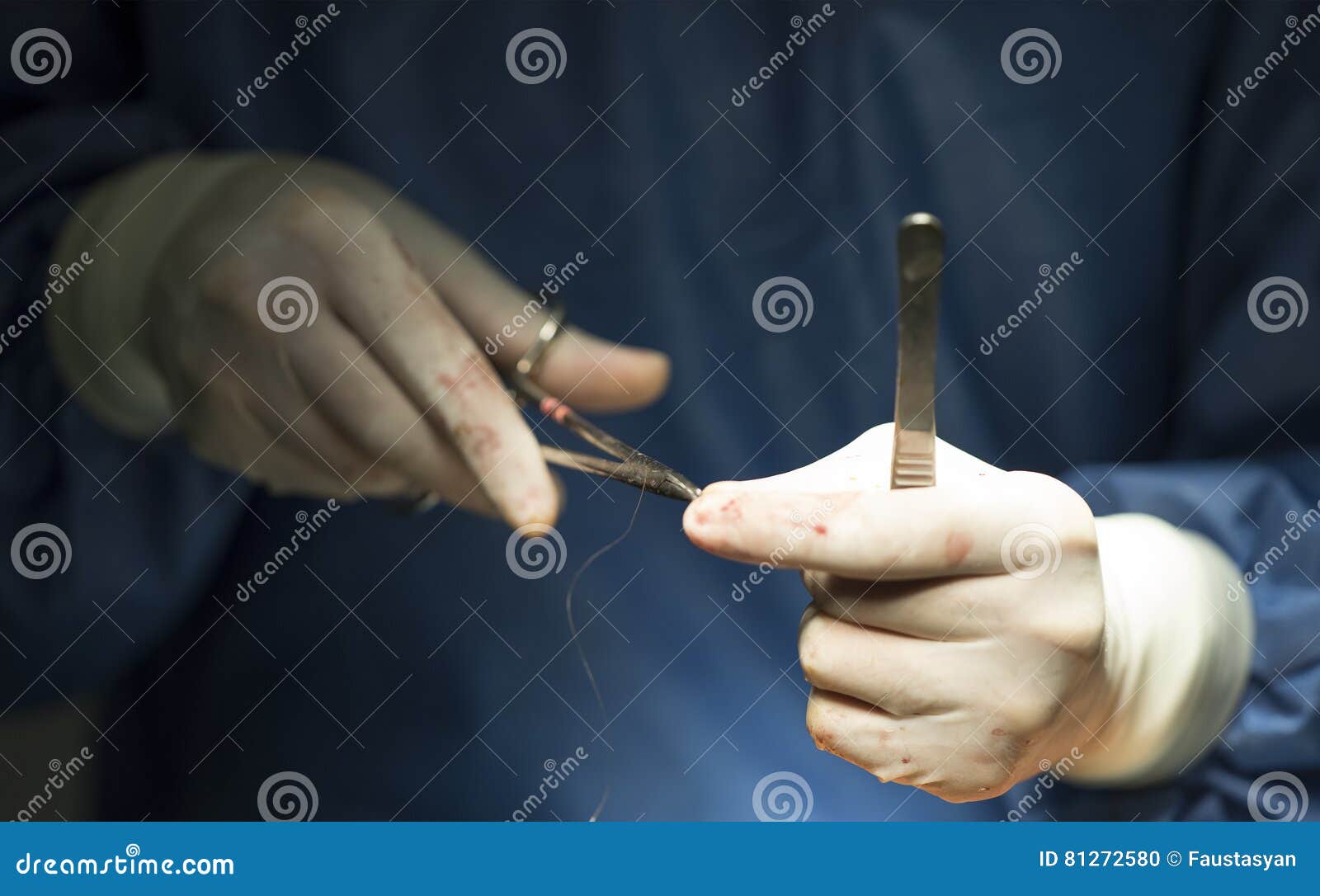Surgeon Holding a Needle and Thread Stock Photo - Image of person ...