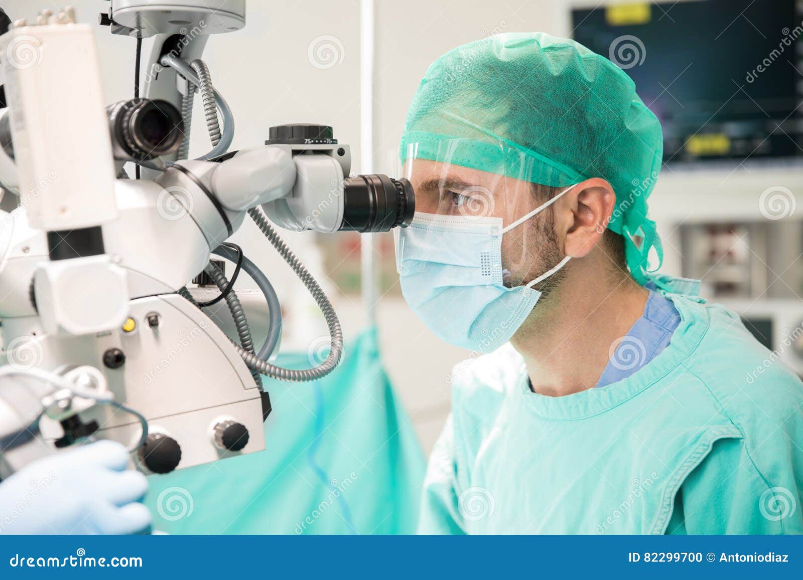 Surgeon Looking through a Microscope Stock Photo - Image of equipment ...