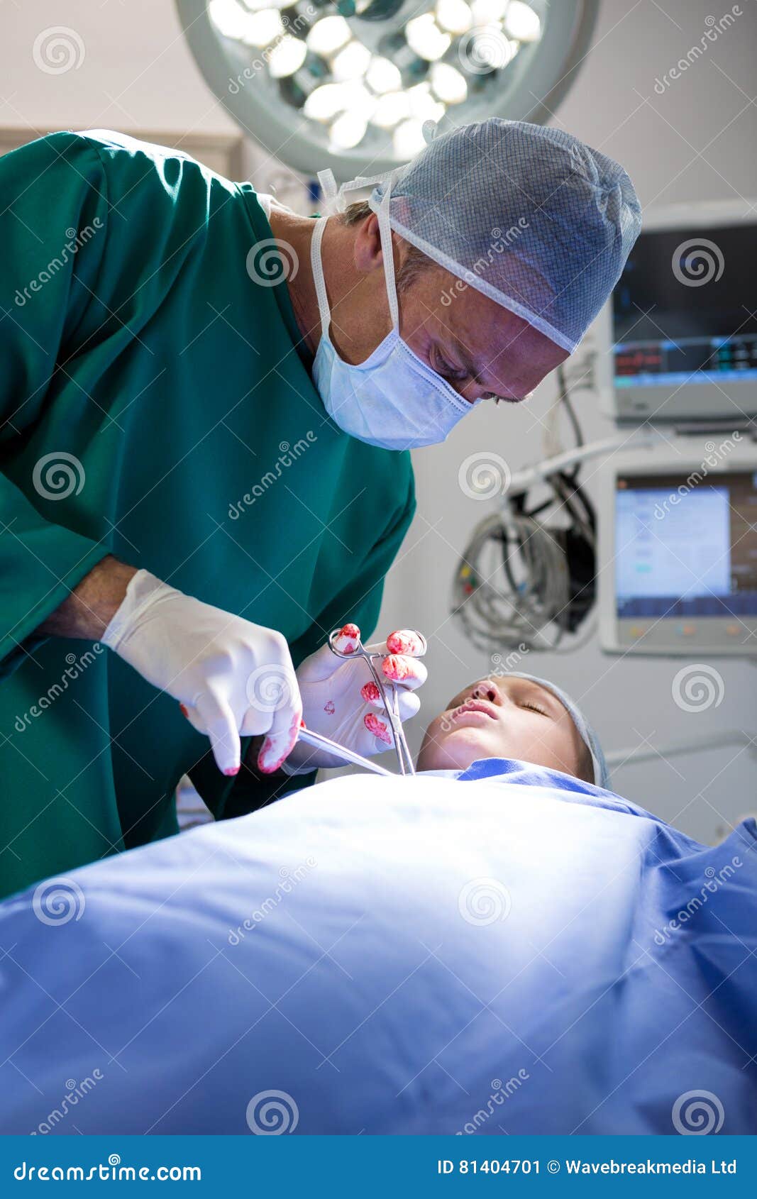 Surgeon operating patient stock image. Image of people - 81404701