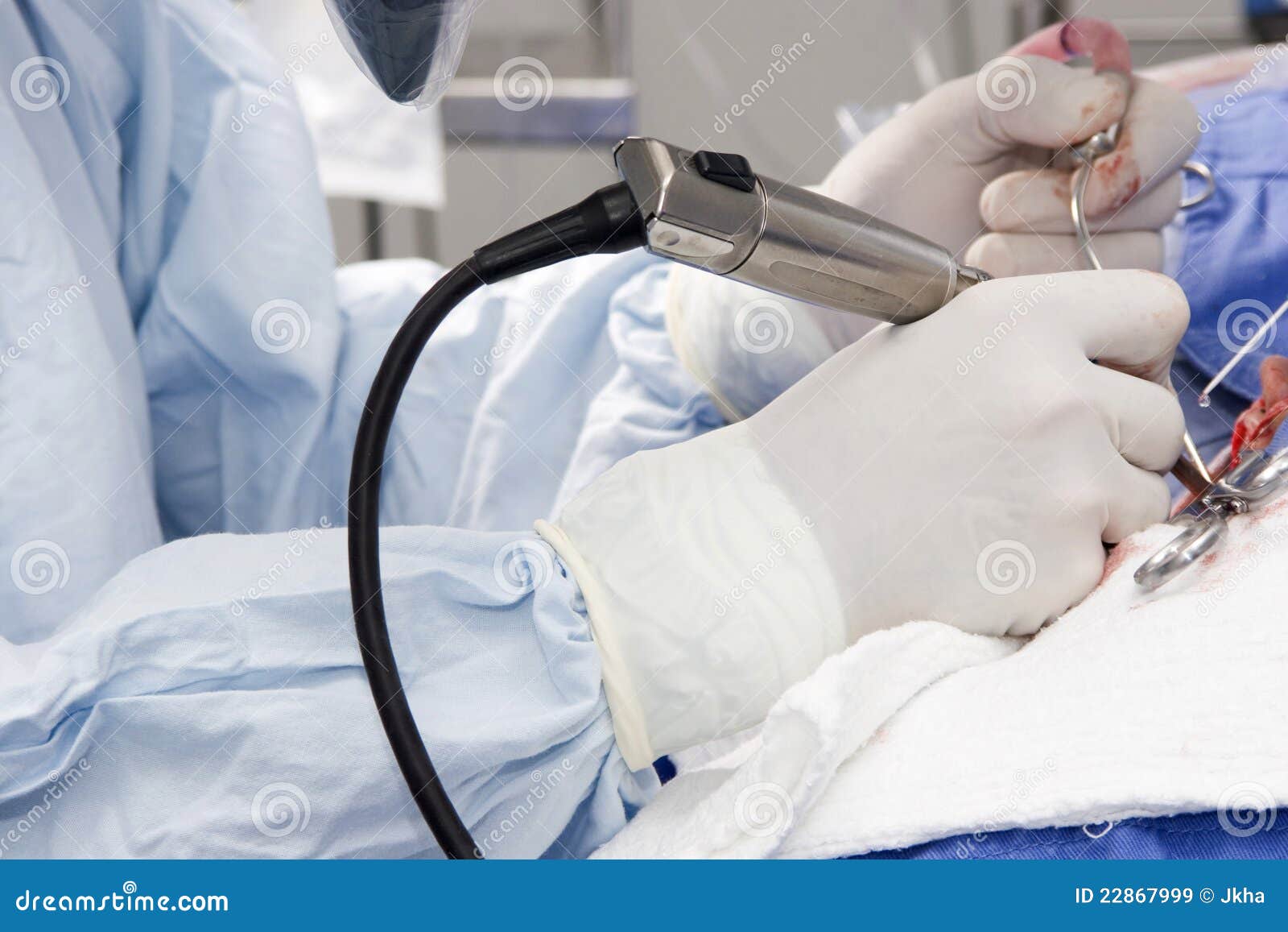 Surgeon Performing Surgery stock image. Image of equipment - 22867999