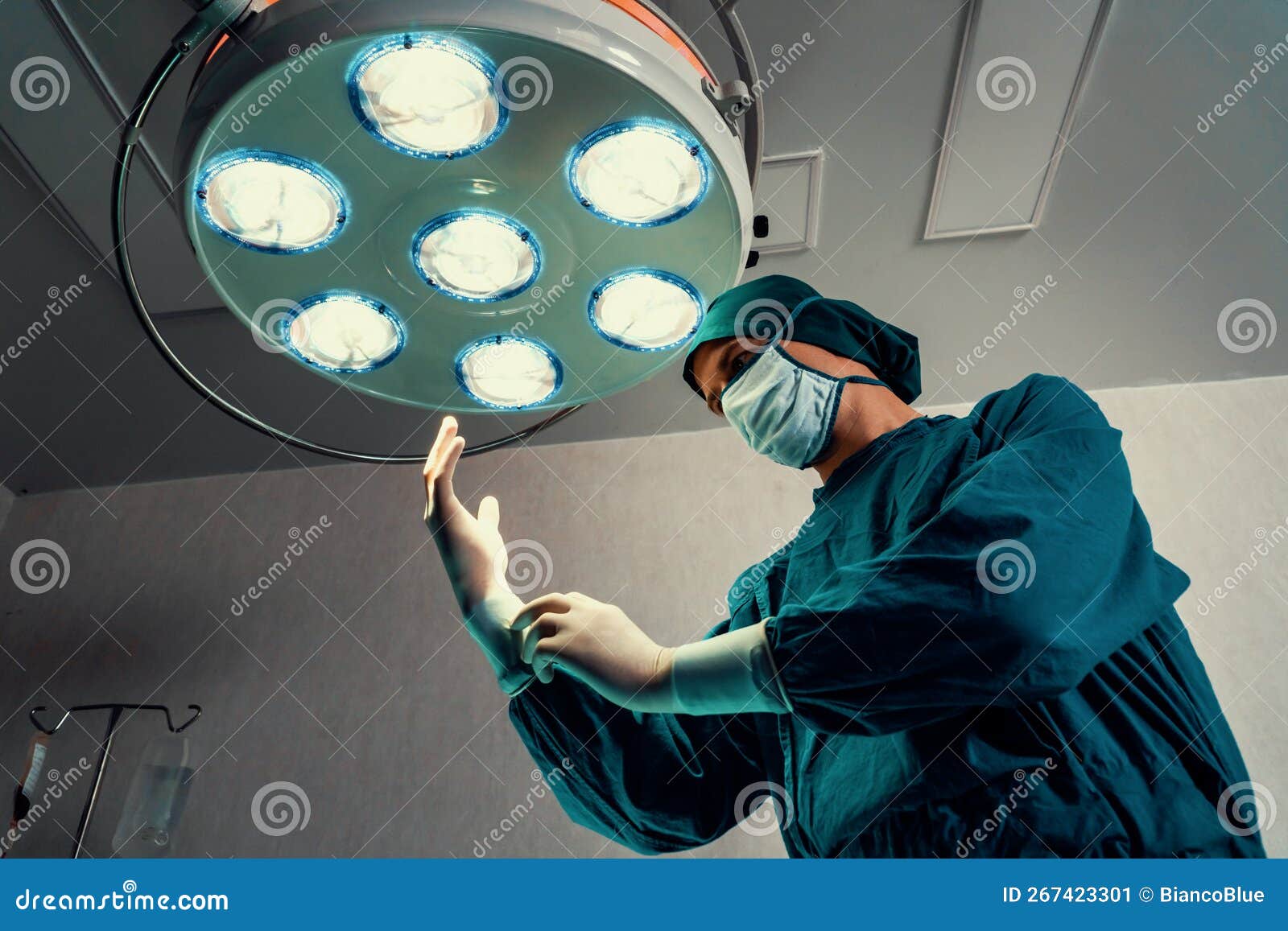 Surgeon Put on Protective Surgical Sterile Glove and Mask before ...