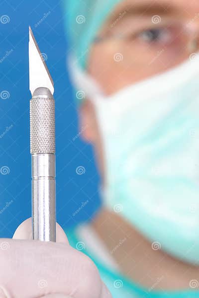 Surgeon with scalpel stock image. Image of male, glasses - 2403081