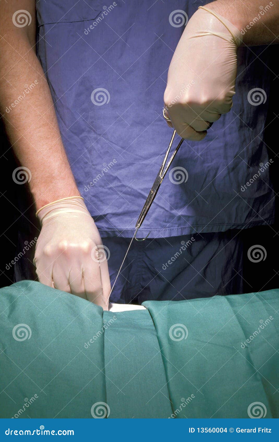 Surgeon Suturing a Wound stock photo. Image of healthcare - 13560004