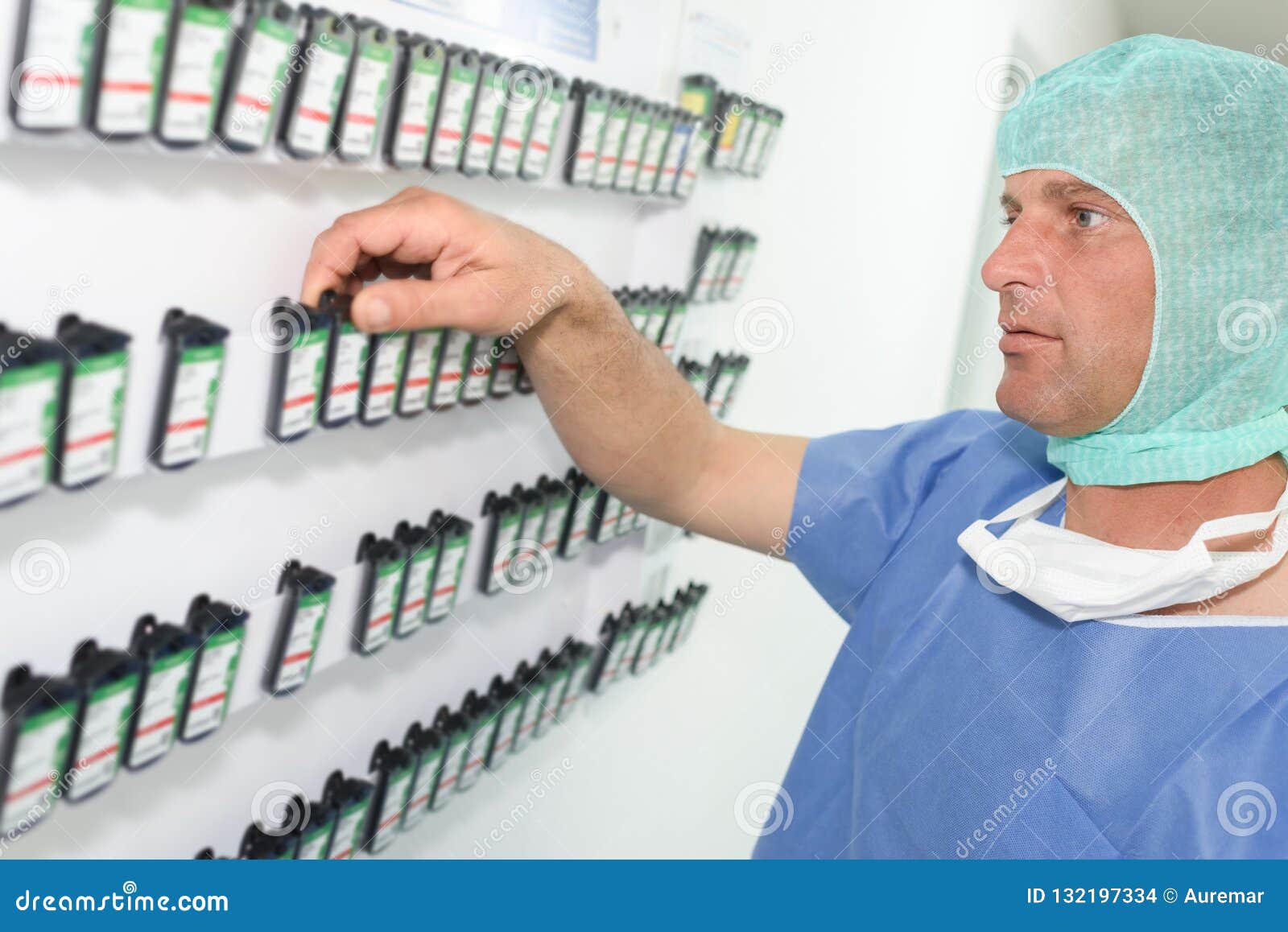 Surgeon Taking Device during Operation Stock Photo - Image of male ...