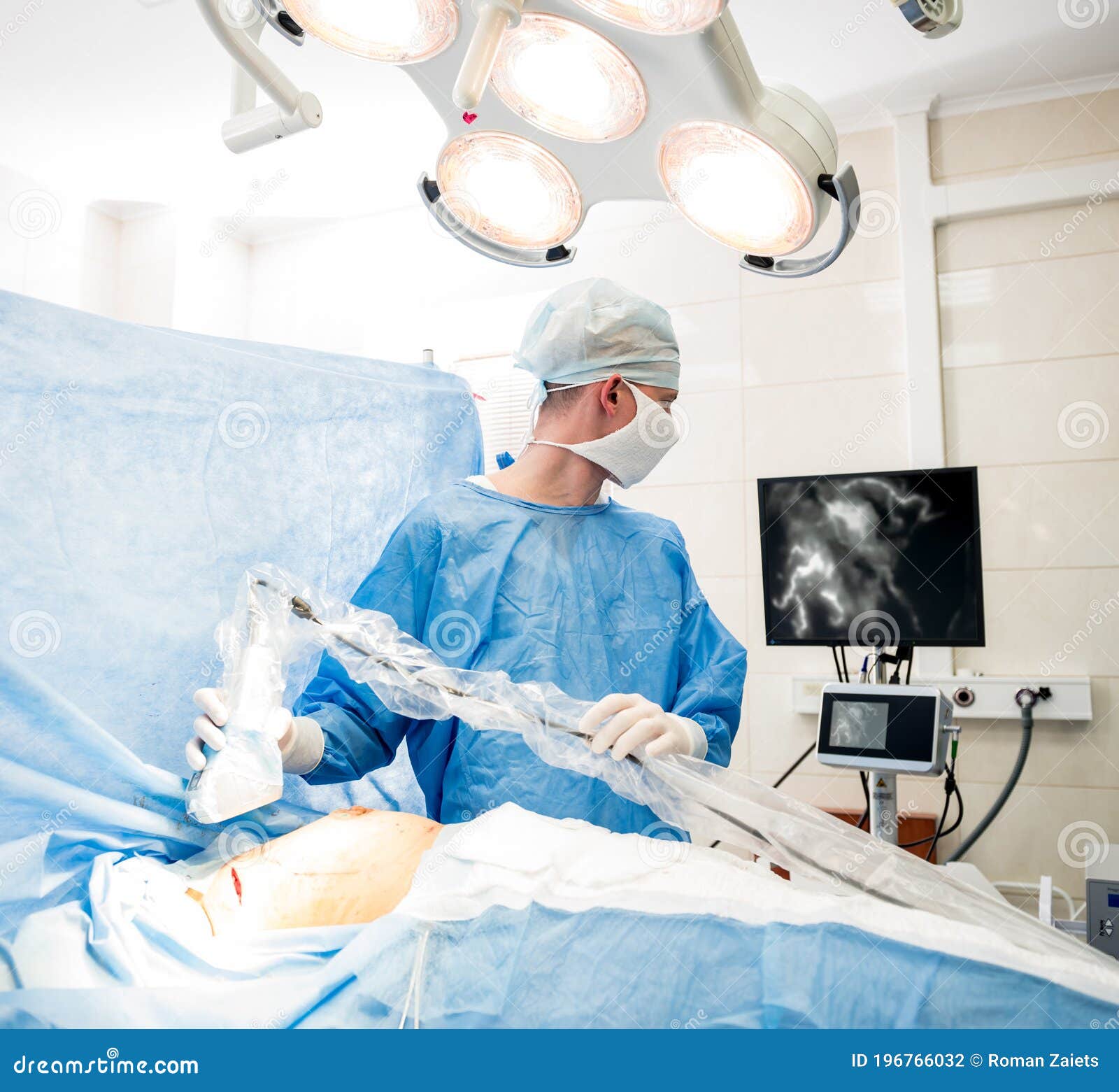 The Surgeon Uses a Portable Fluorescence Imaging Device during Breast ...