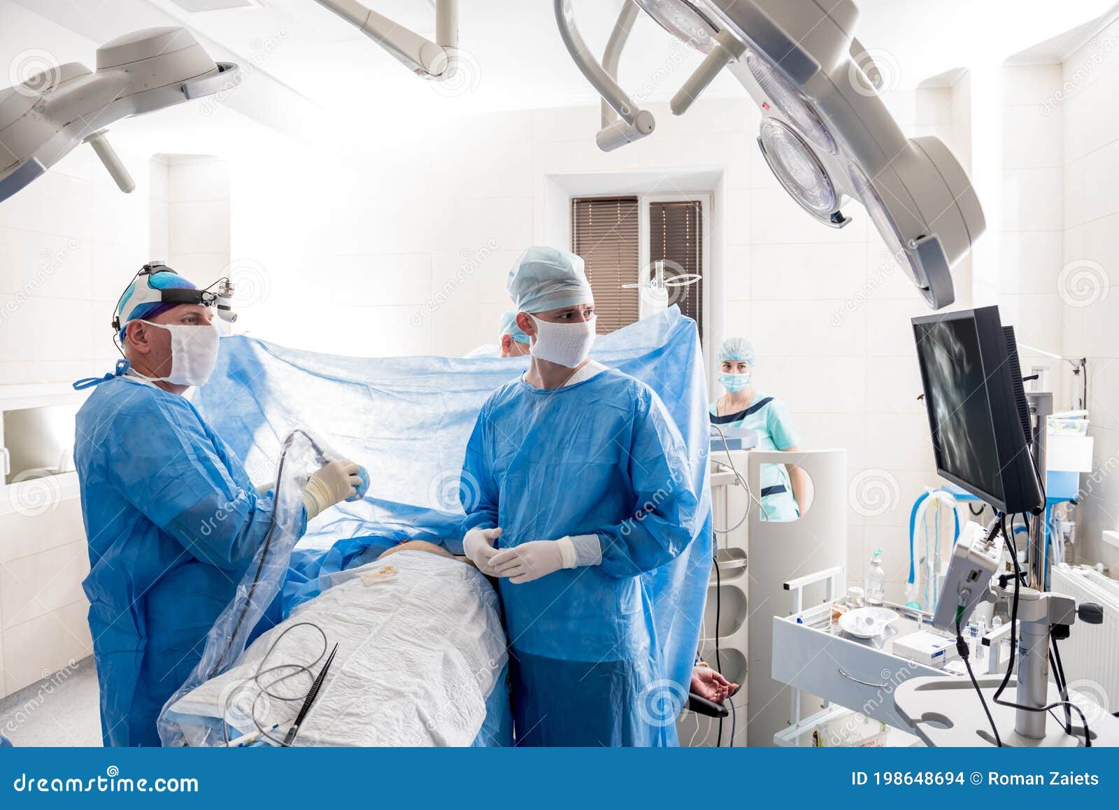 The Surgeon Uses a Portable Fluorescence Imaging Device during Breast ...