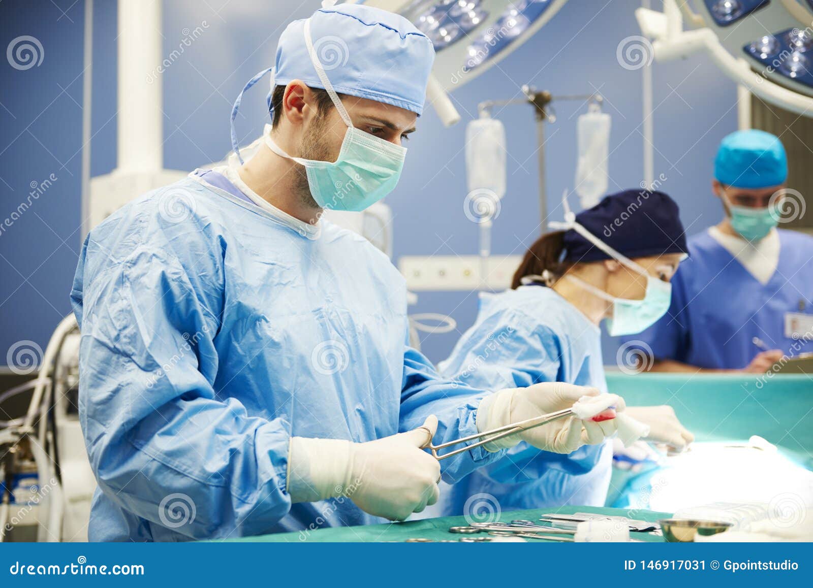 Surgeon Using Medical Scissors while an Operation Stock Image - Image ...