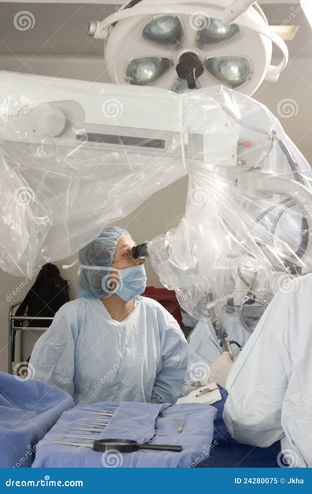 Surgeon Using Operating Microscope Stock Image - Image of people, blue ...