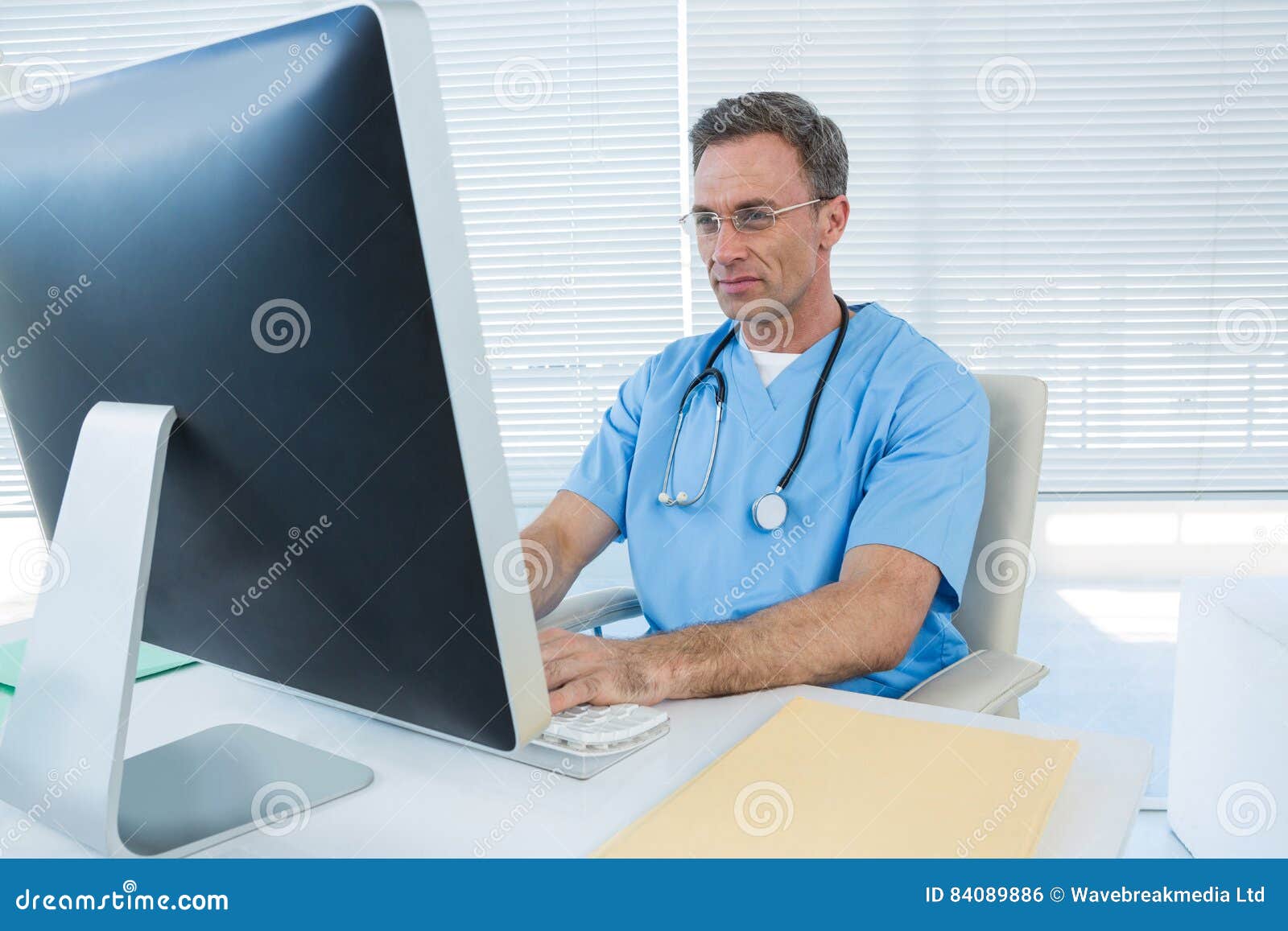 Surgeon Working on Personal Computer Stock Photo - Image of adult ...