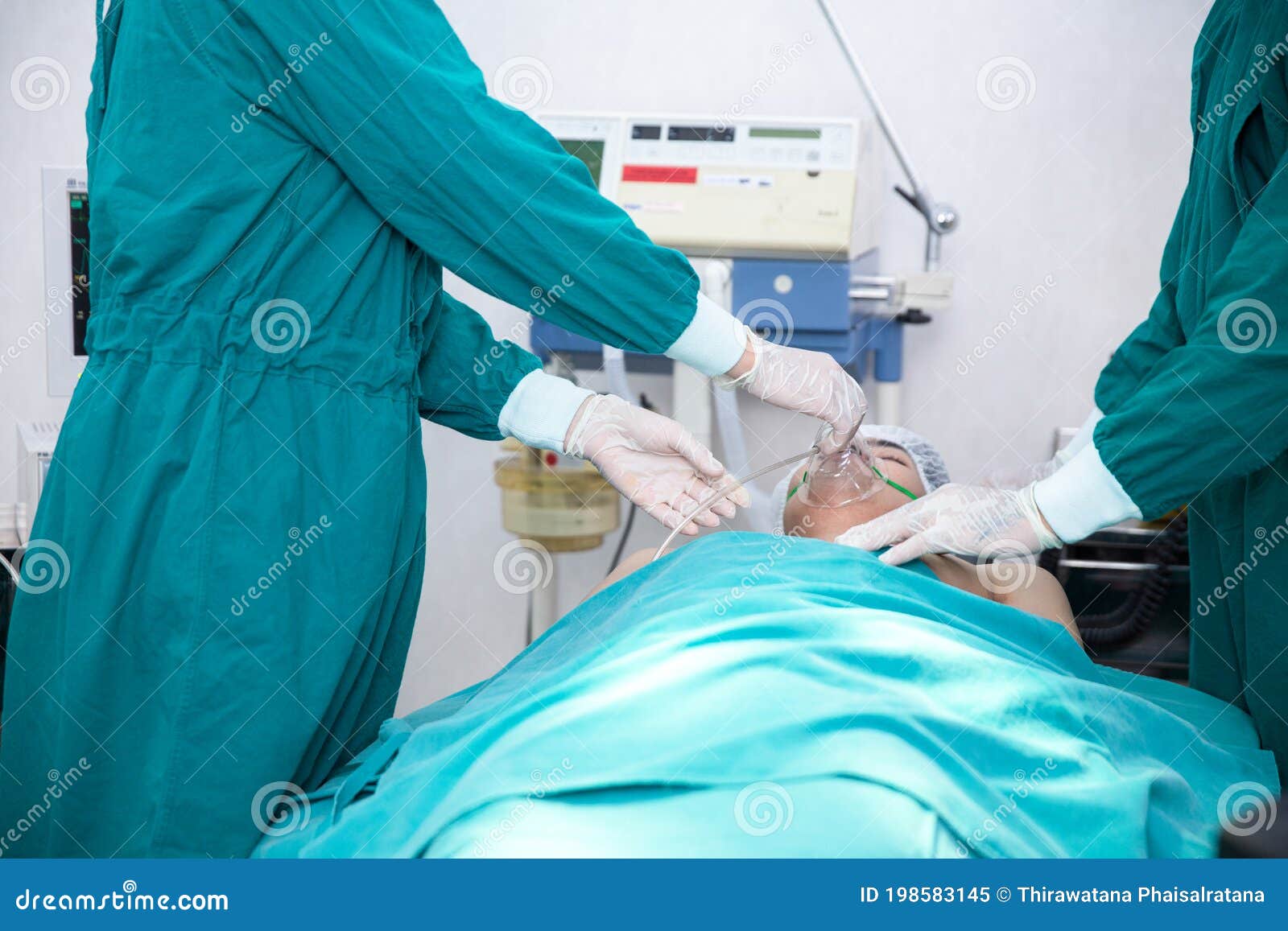 The Surgeon is Working on a Ventilator for a Patient in the Emergency ...
