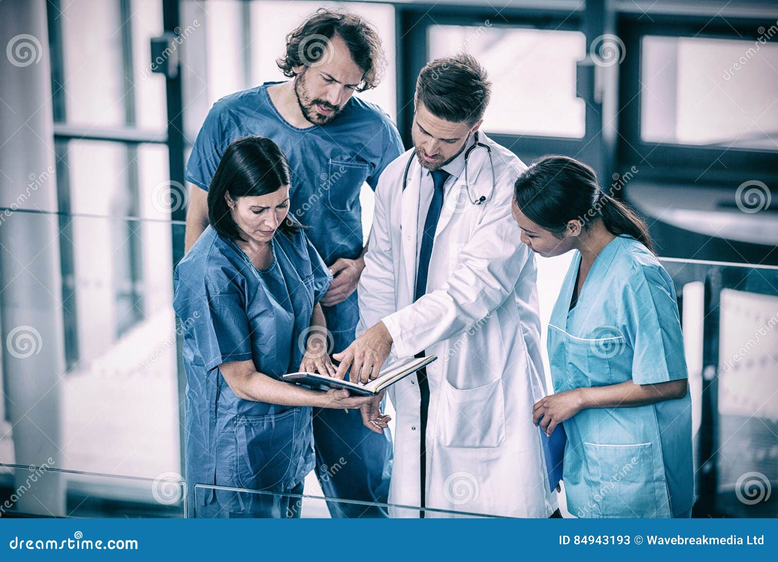 Surgeons Discussing with Nurse Stock Image - Image of adult, dressed ...