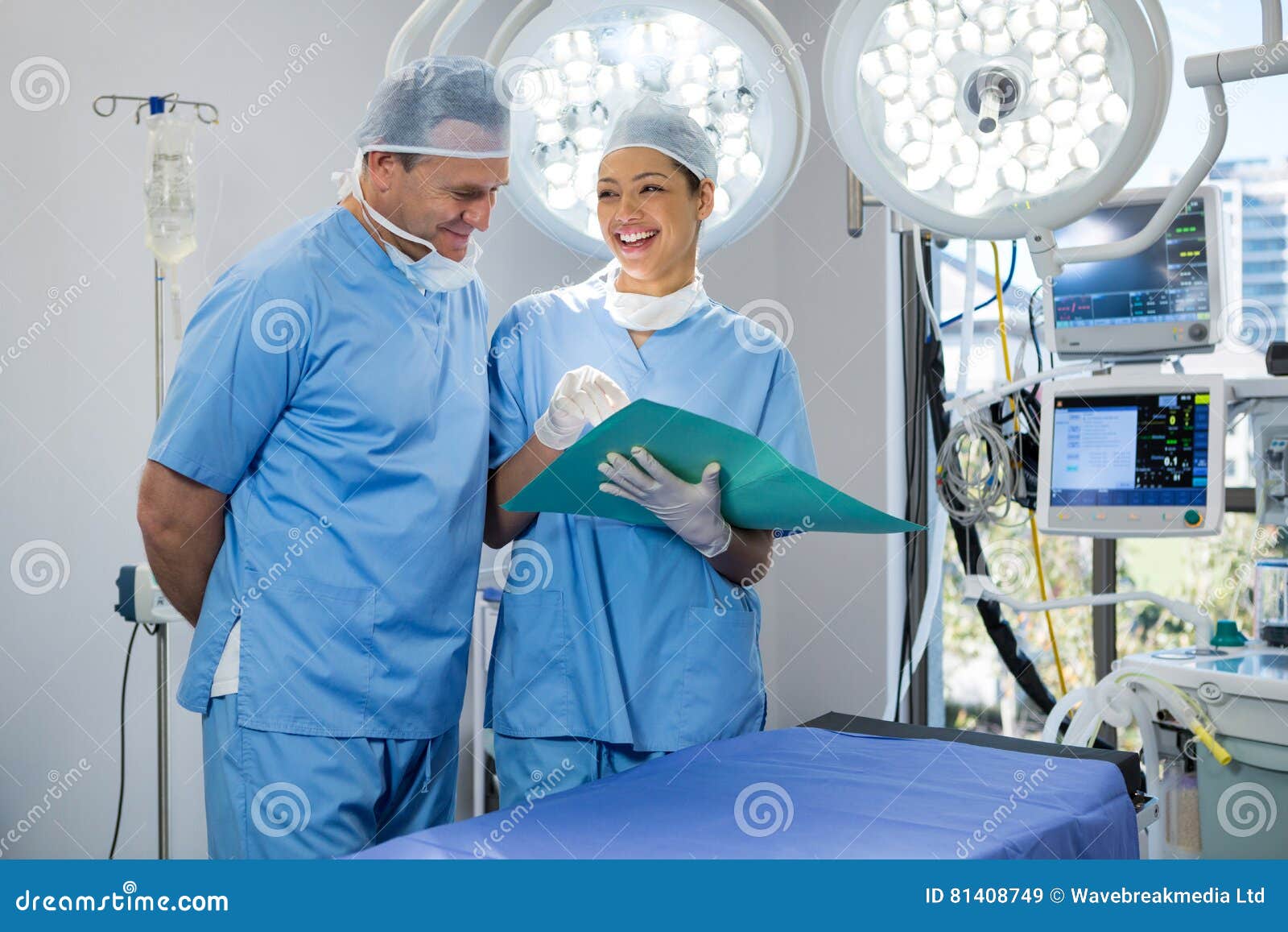 Surgeons Discussing Over File Stock Image - Image of drip, mask: 81408749