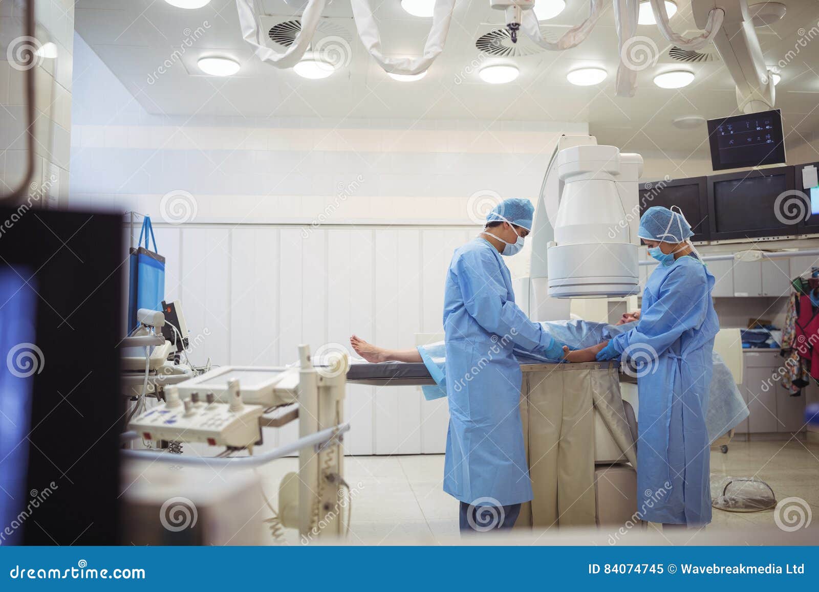 Surgeons Examining Patient in Operation Theater Stock Image - Image of ...