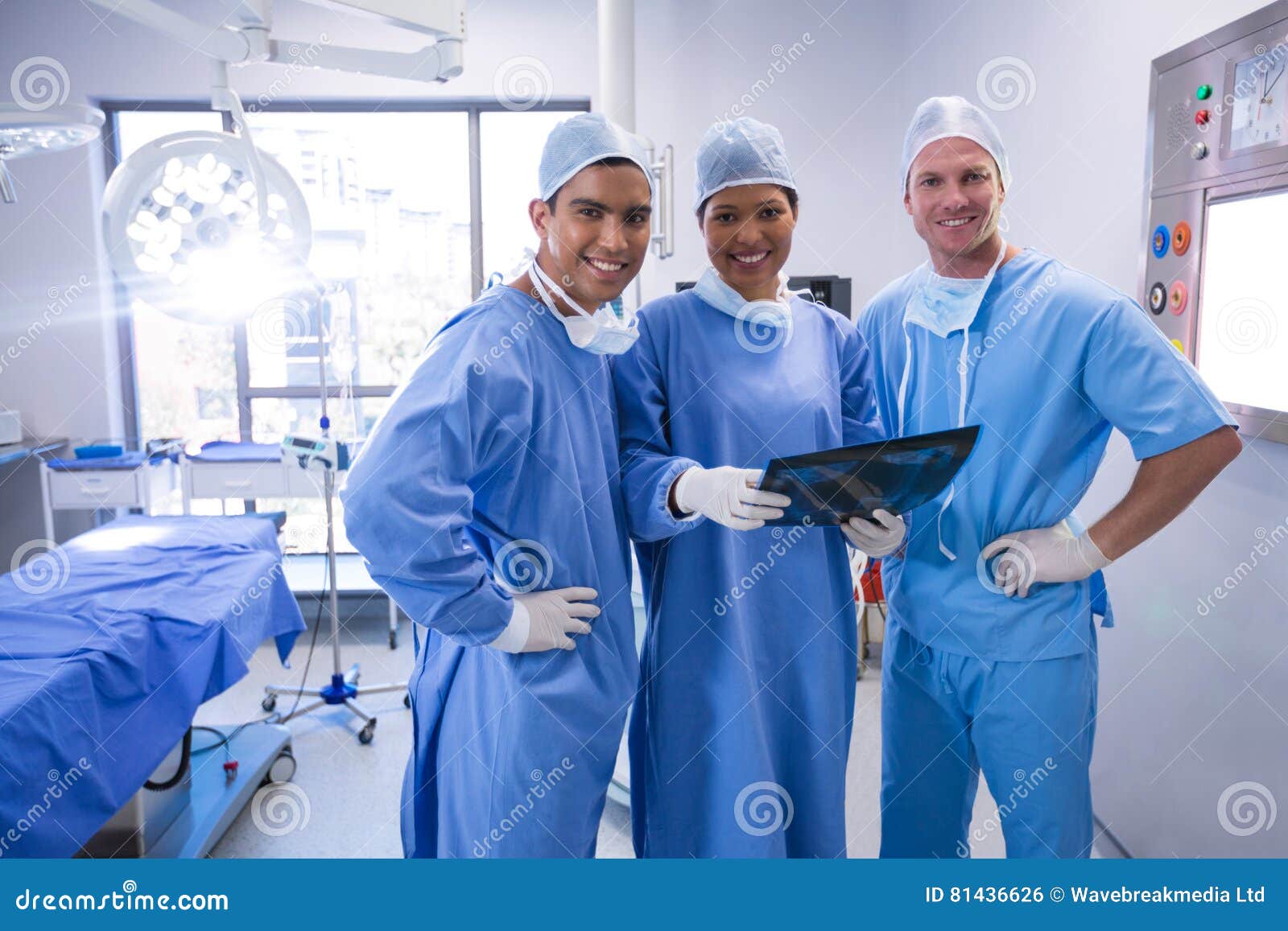 Surgeons Examining X-ray in Operation Room at Hospital Stock Photo ...