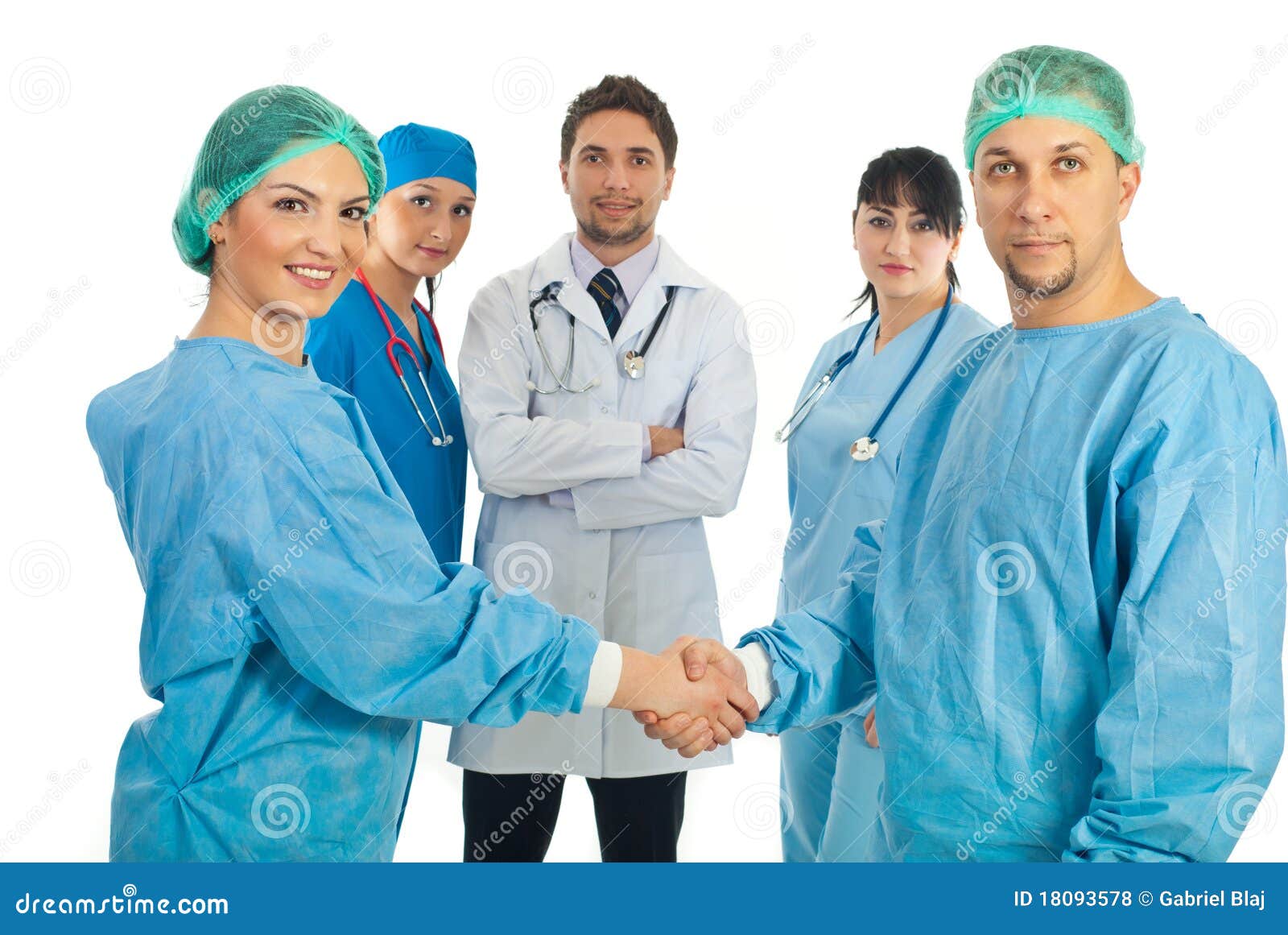 Surgeons Shaking Hands In Operation Room Royalty-Free Stock Photo ...