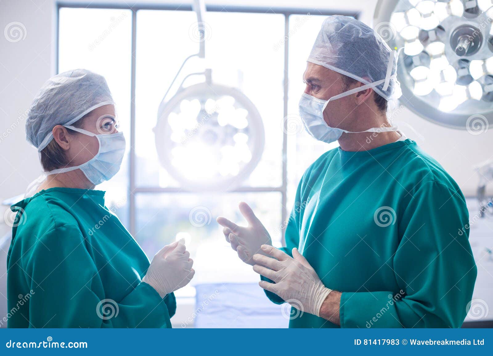 Surgeons Interacting with Each Other in Operation Room Stock Image ...