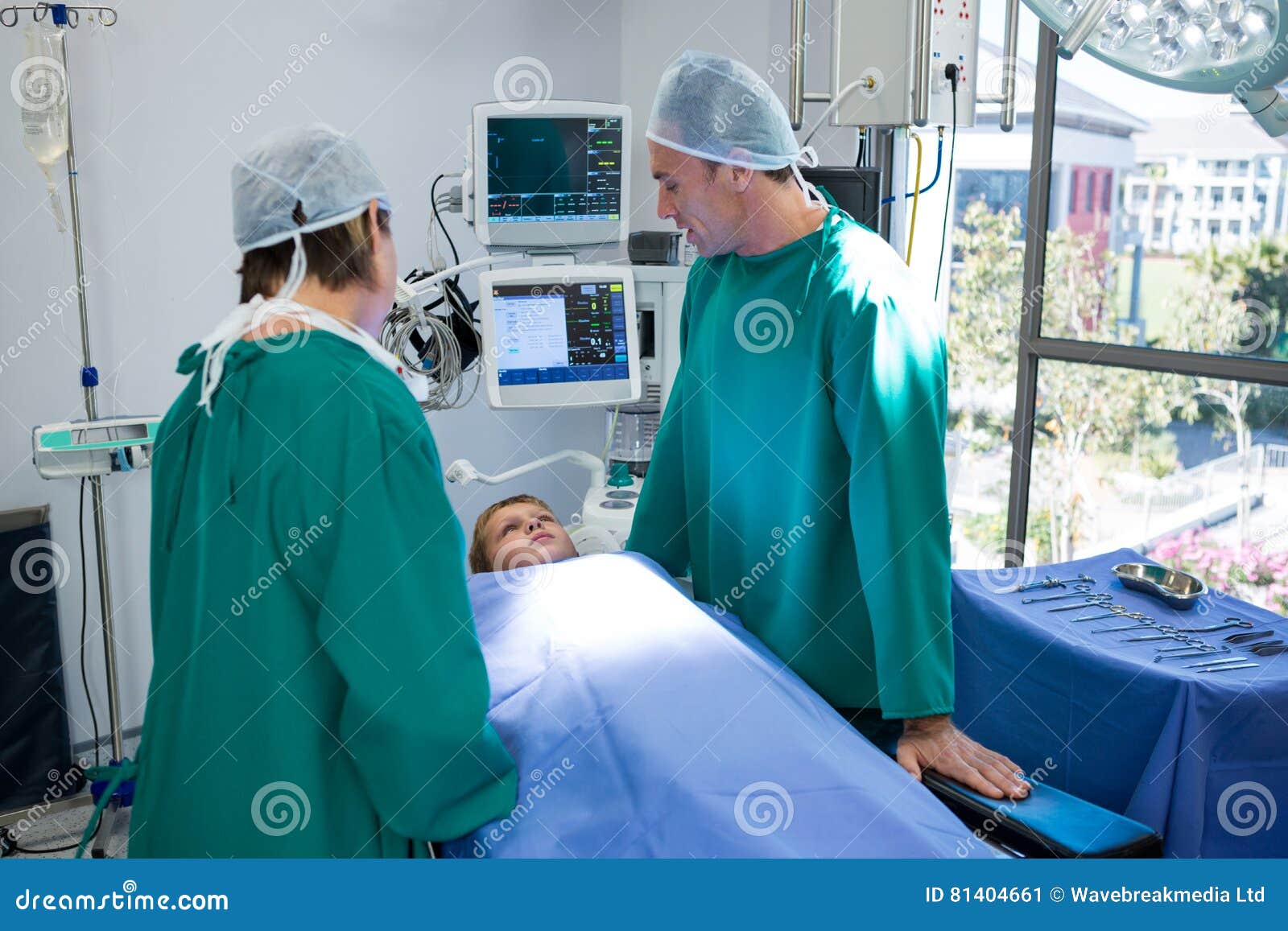 Surgeons Interacting with Patient in Operation Theater Stock Image ...